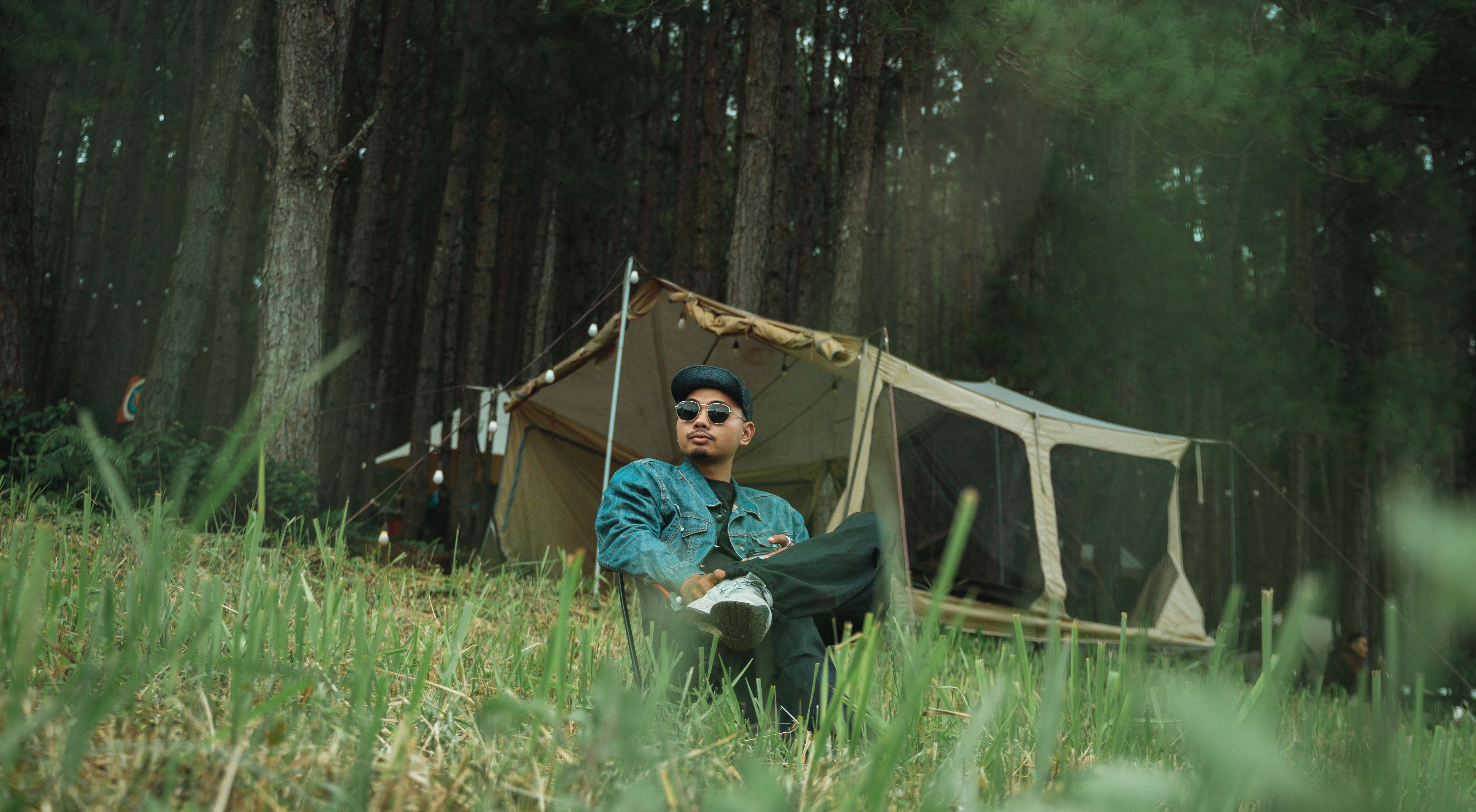 Forest Shelter Portrait: Quiet Moment by a Canvas Tent