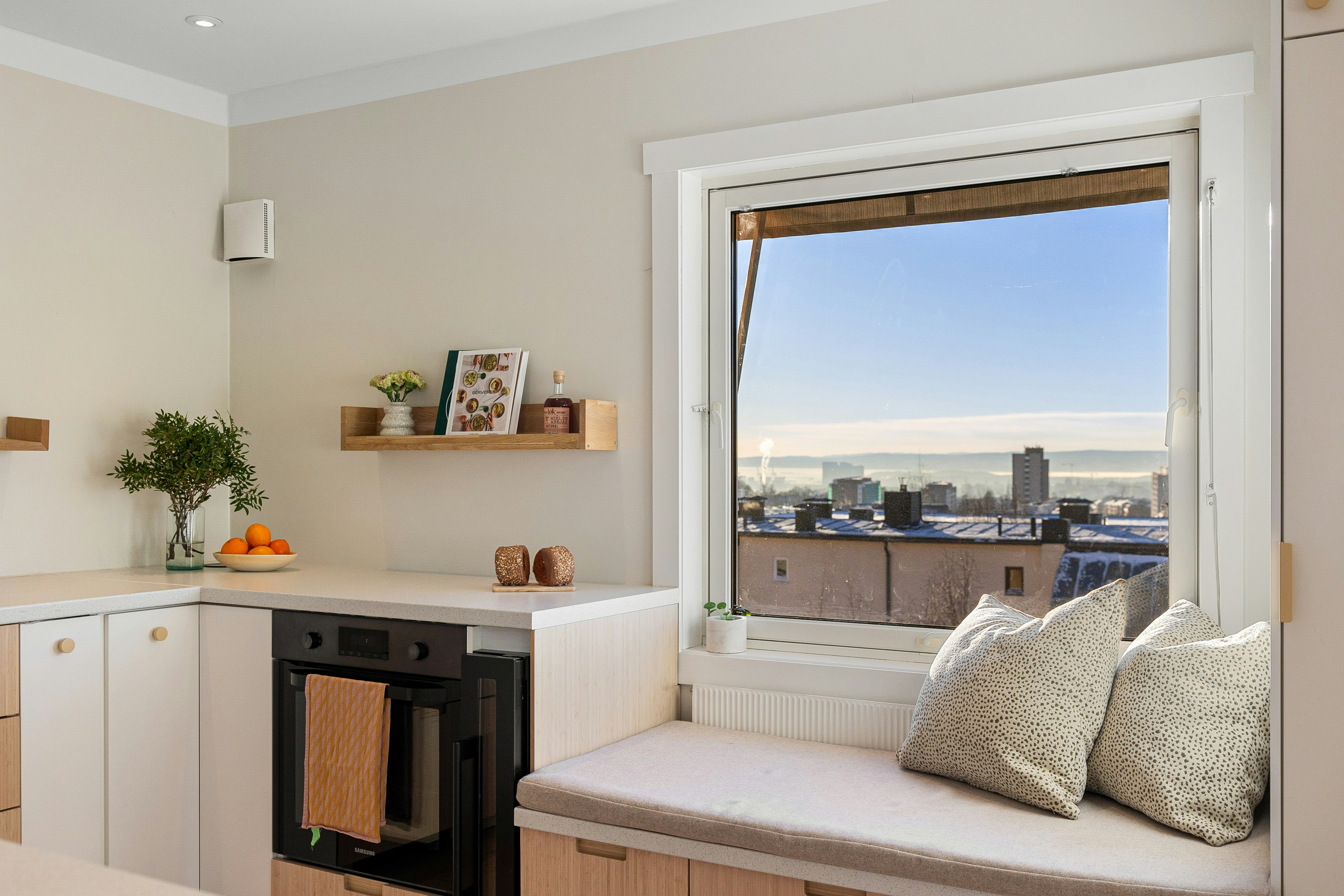 A kitchen with a window seat and a sink photo – Free Window Image on ...