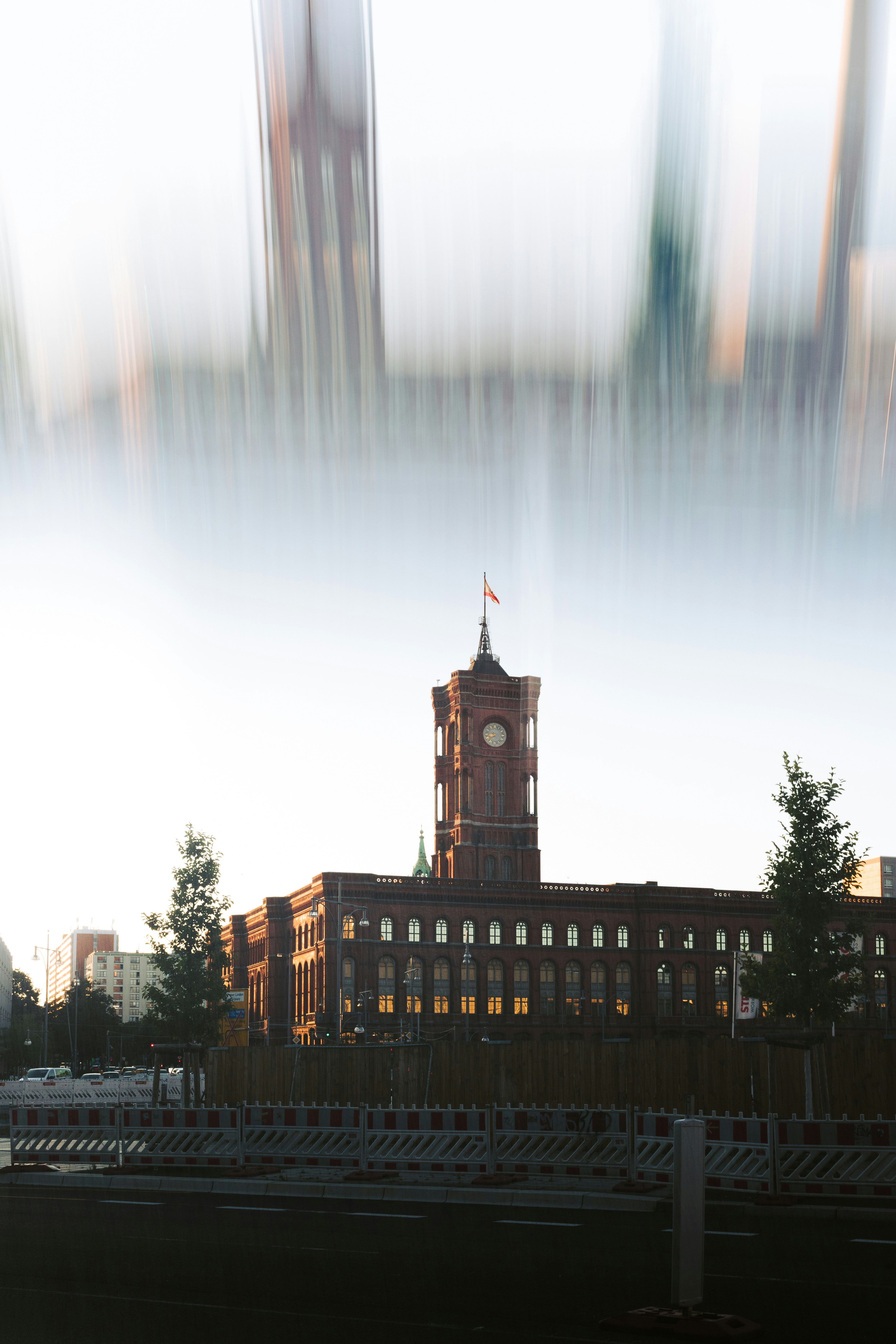 Clock Tower Emerges Through Veiled Vertical Motion Blur