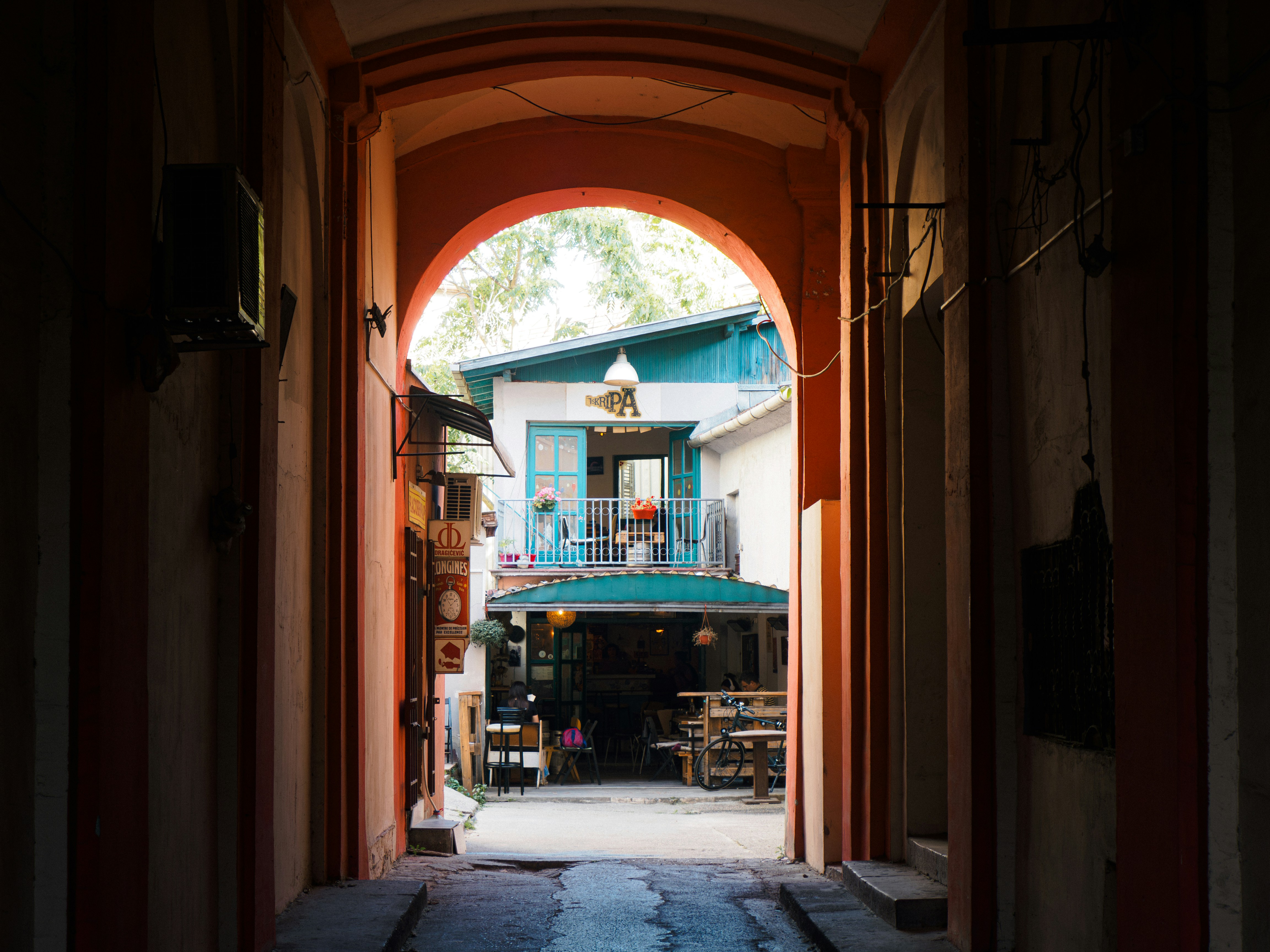 Hidden Courtyard Through the Archway