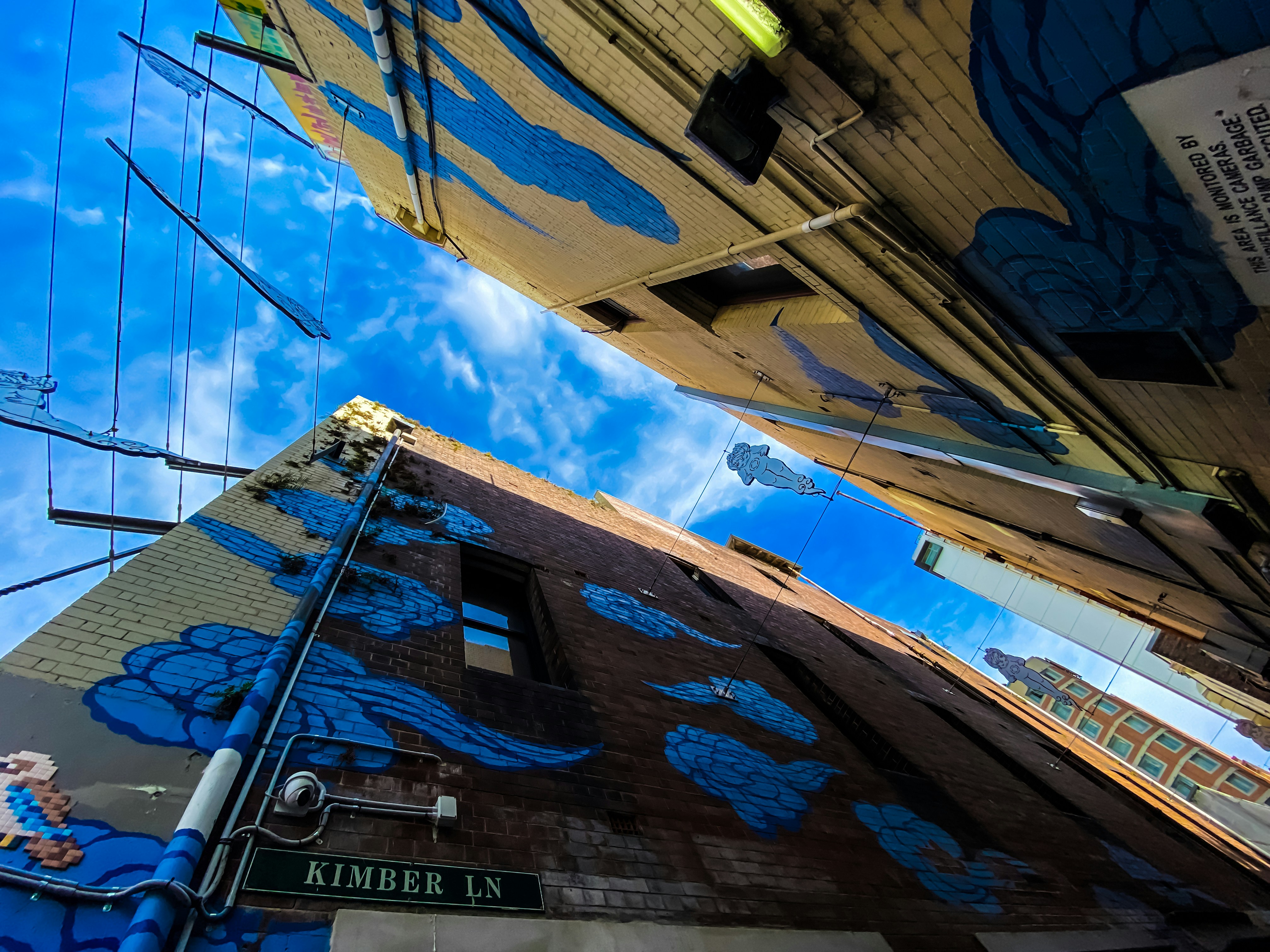 A street sign and a building with a sky background photo – Free Kimber ...