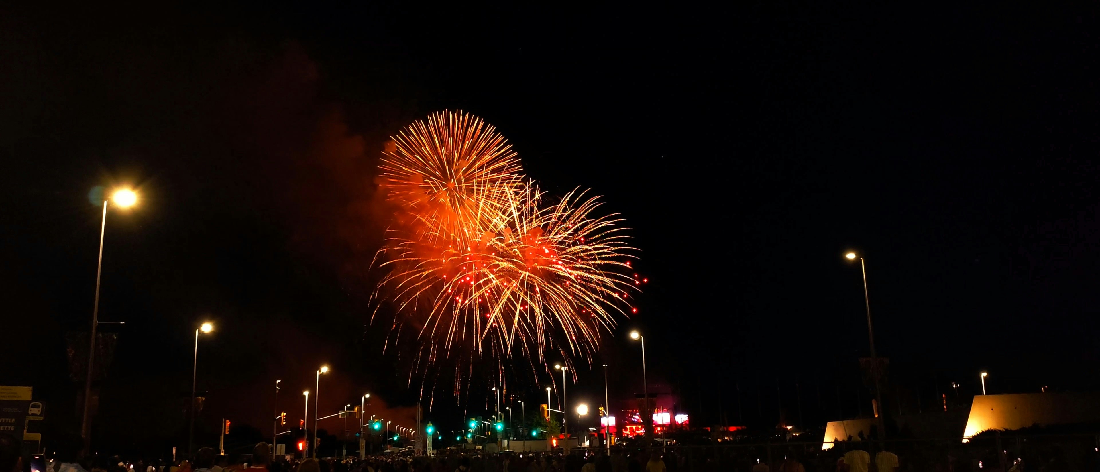 A large fireworks display in the night sky photo – Free Canada Image on ...