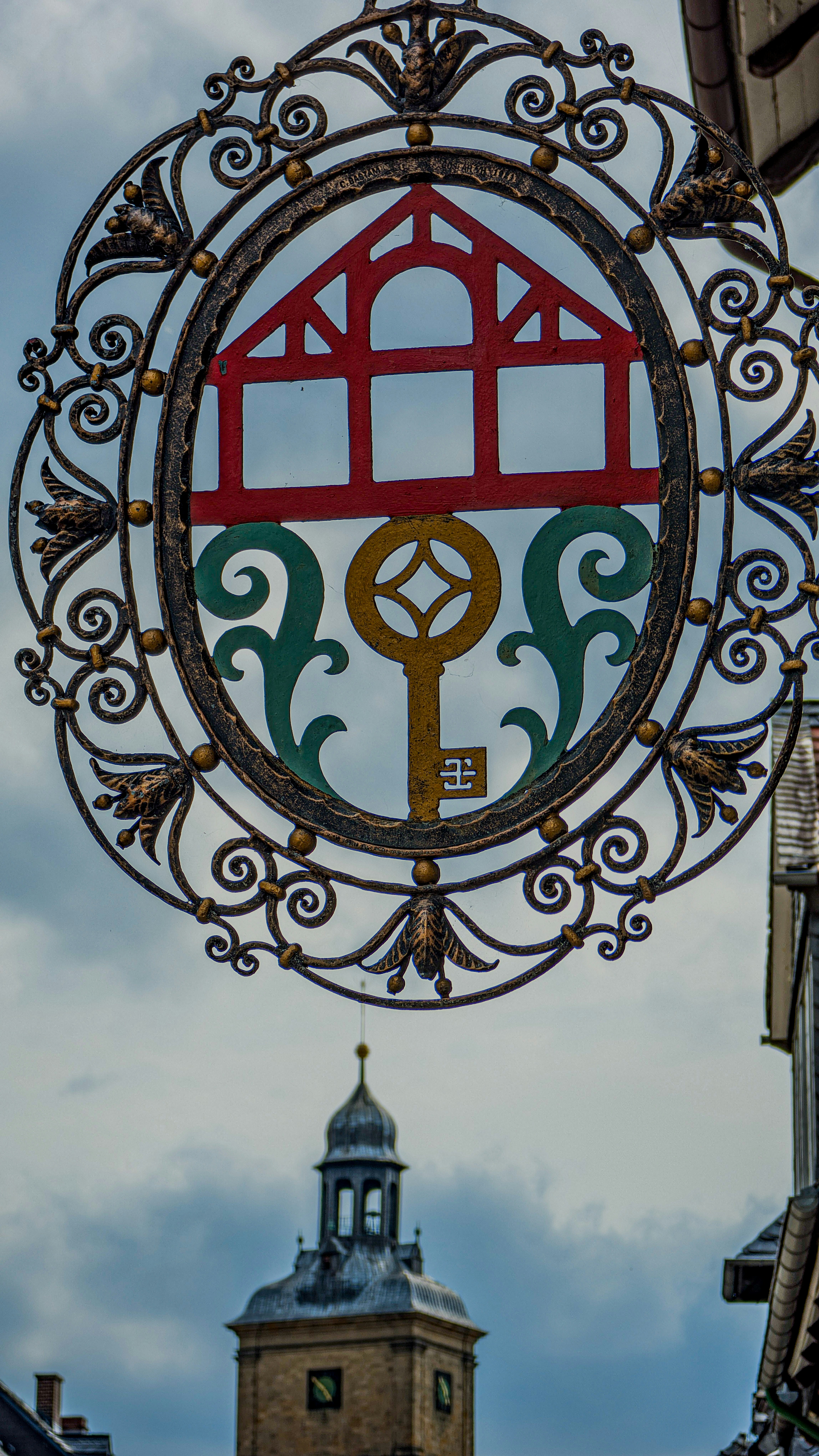 A clock that is on the side of a building