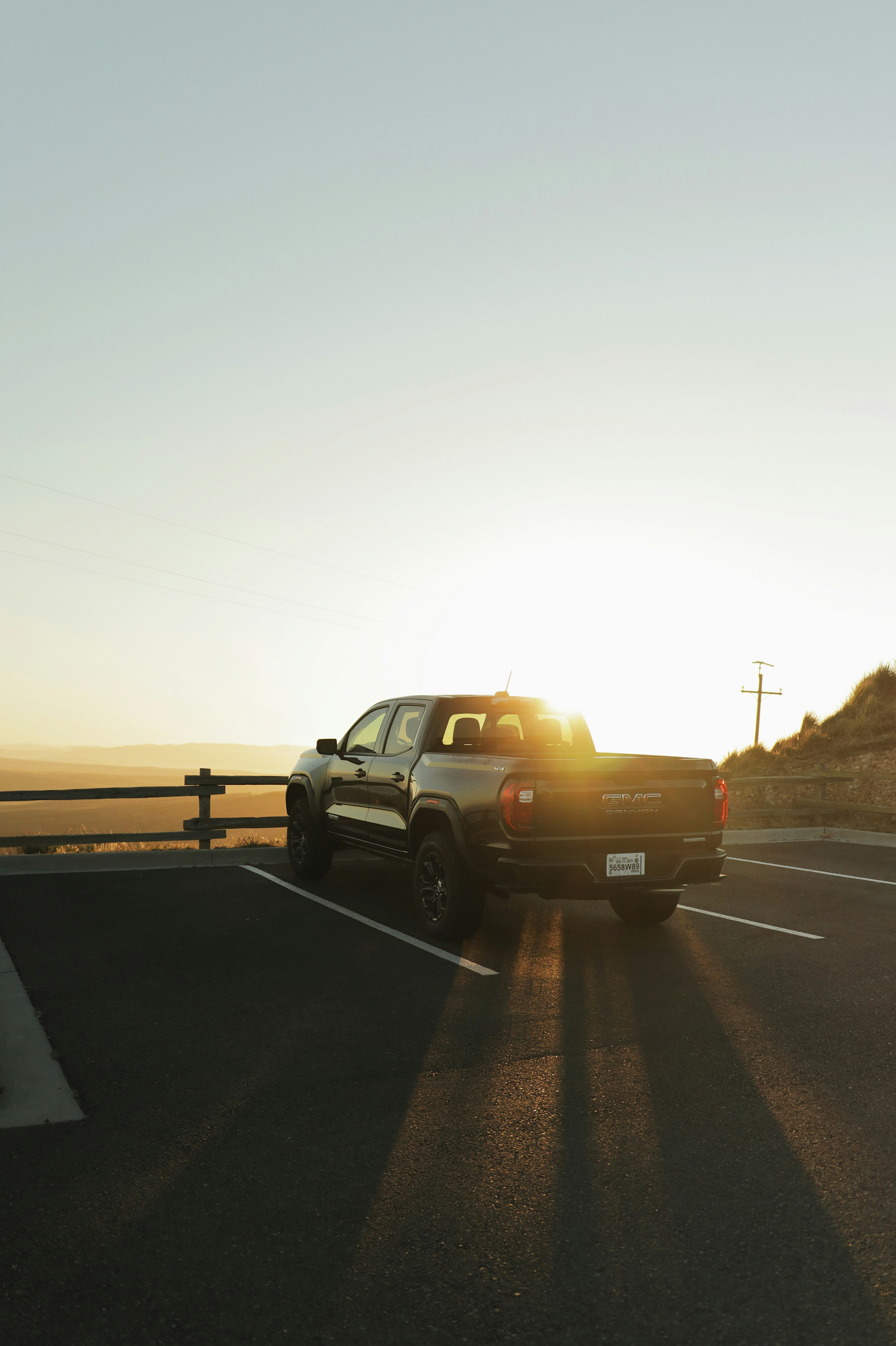 A pickup truck driving down a highway at sunset photo – Free California ...