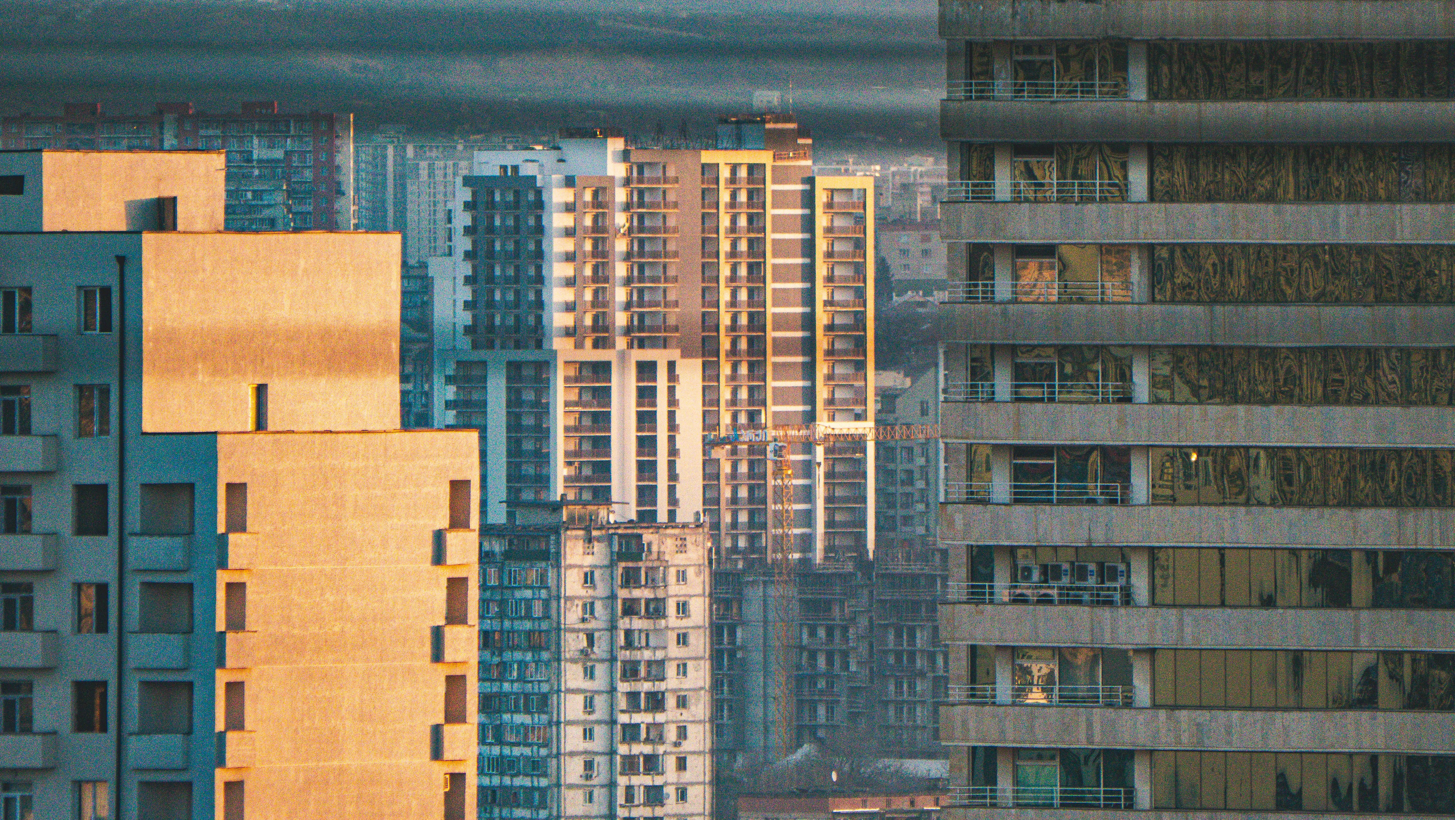 A view of a city with tall buildings photo – Free Building Image on ...