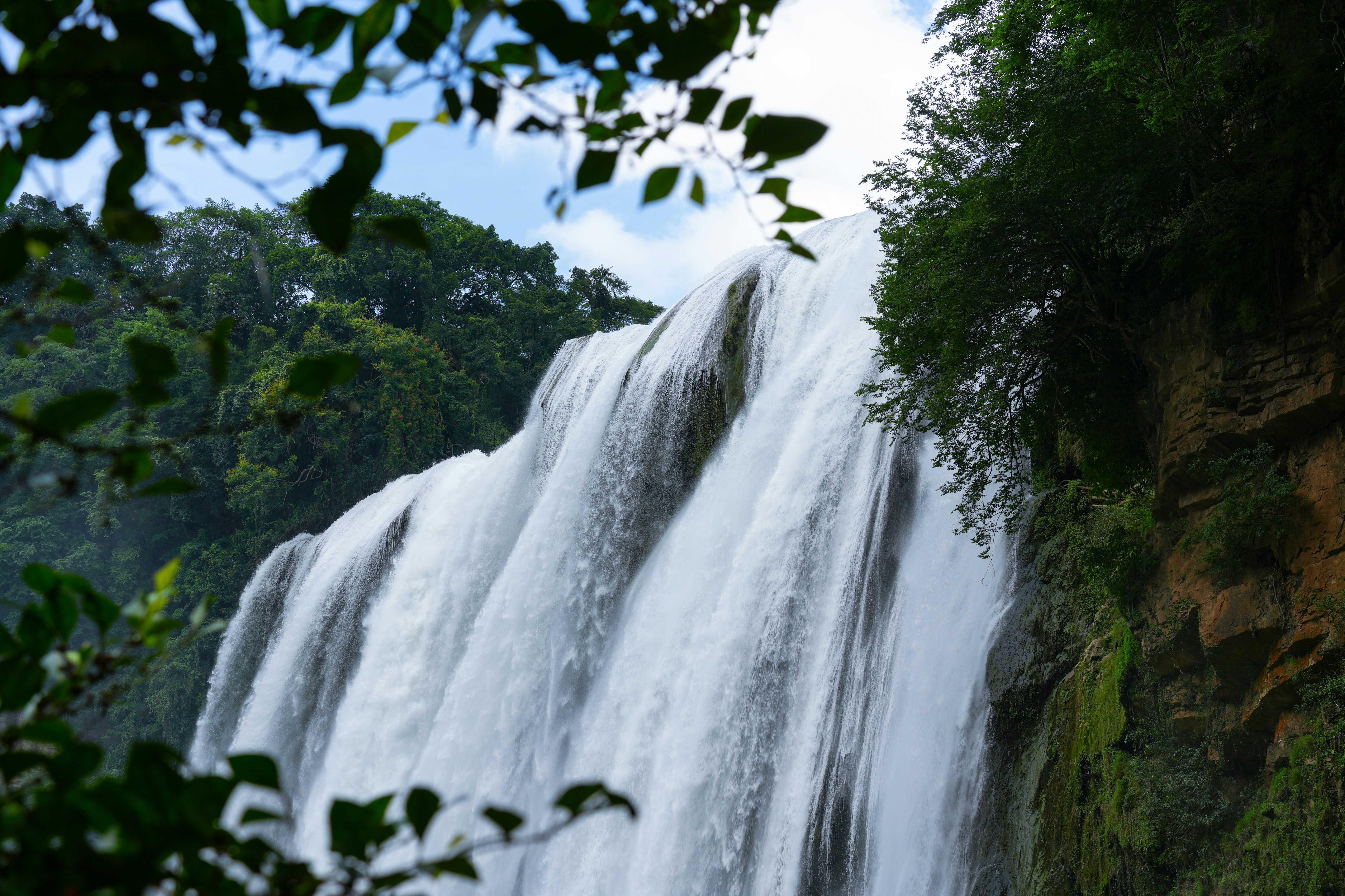 A view of a waterfall from a distance photo – Free Nature Image on Unsplash