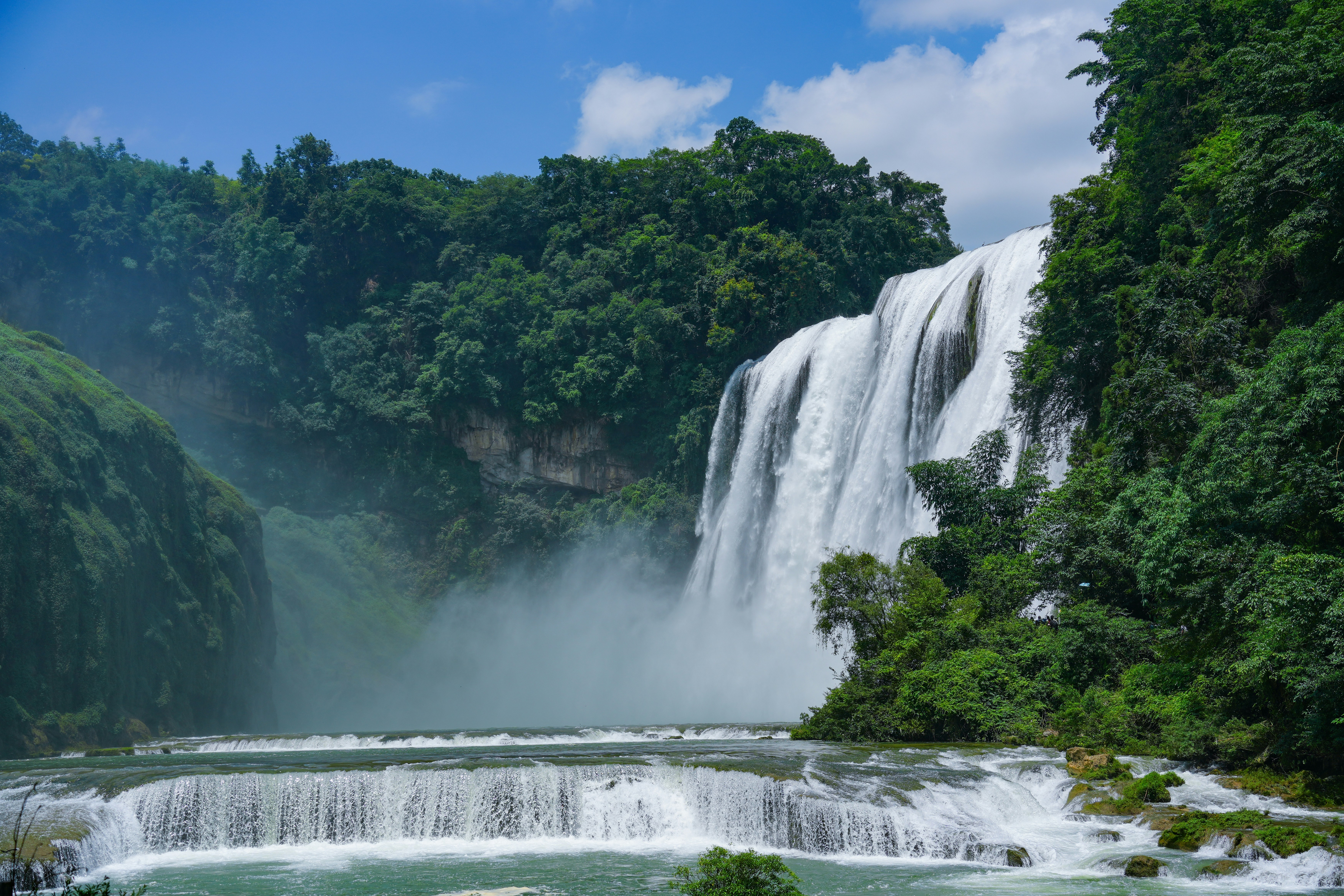 A view of a waterfall and a river photo – Free Nature Image on Unsplash