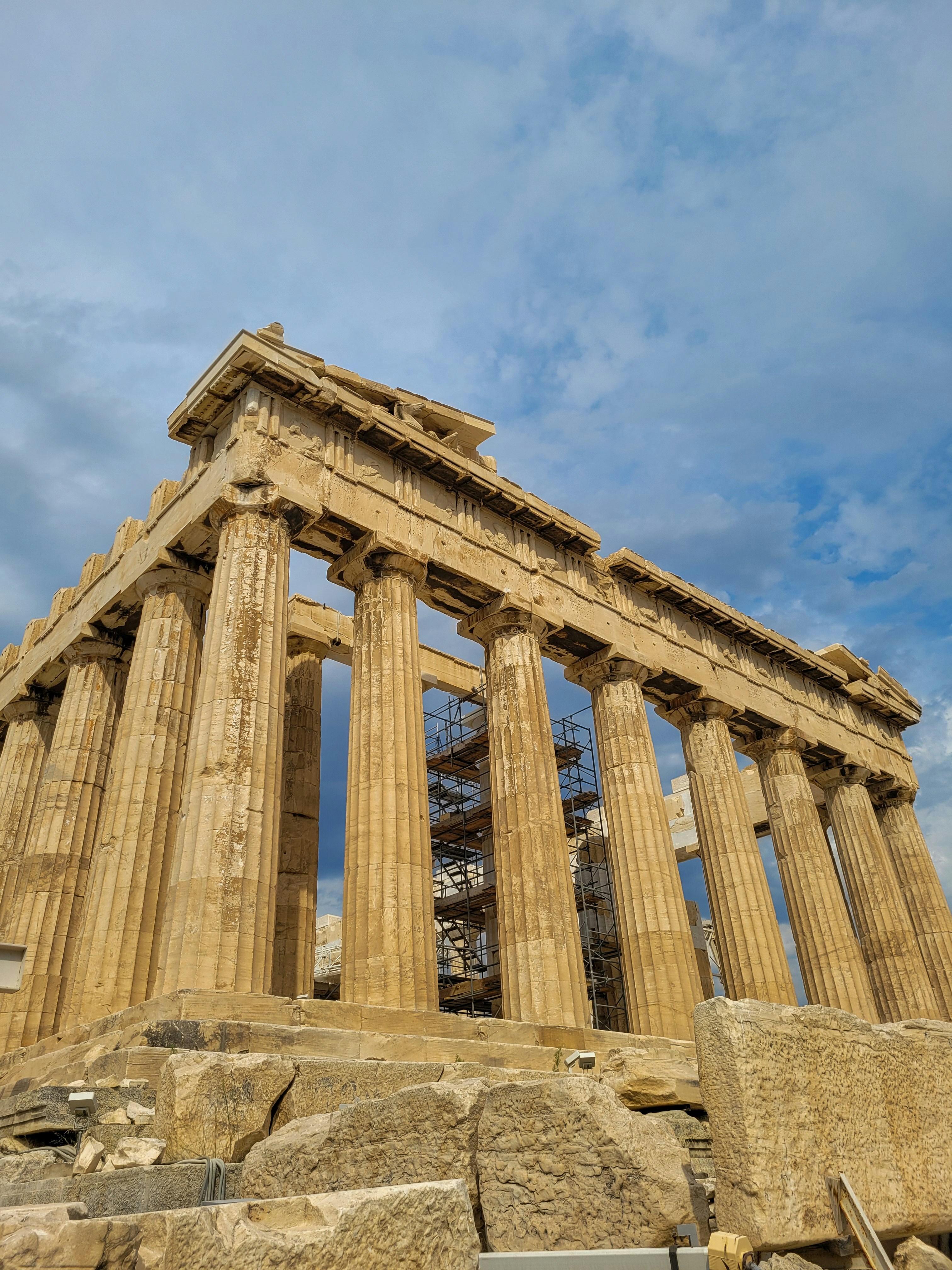 The part of a large building with many columns photo – Free Greek ...