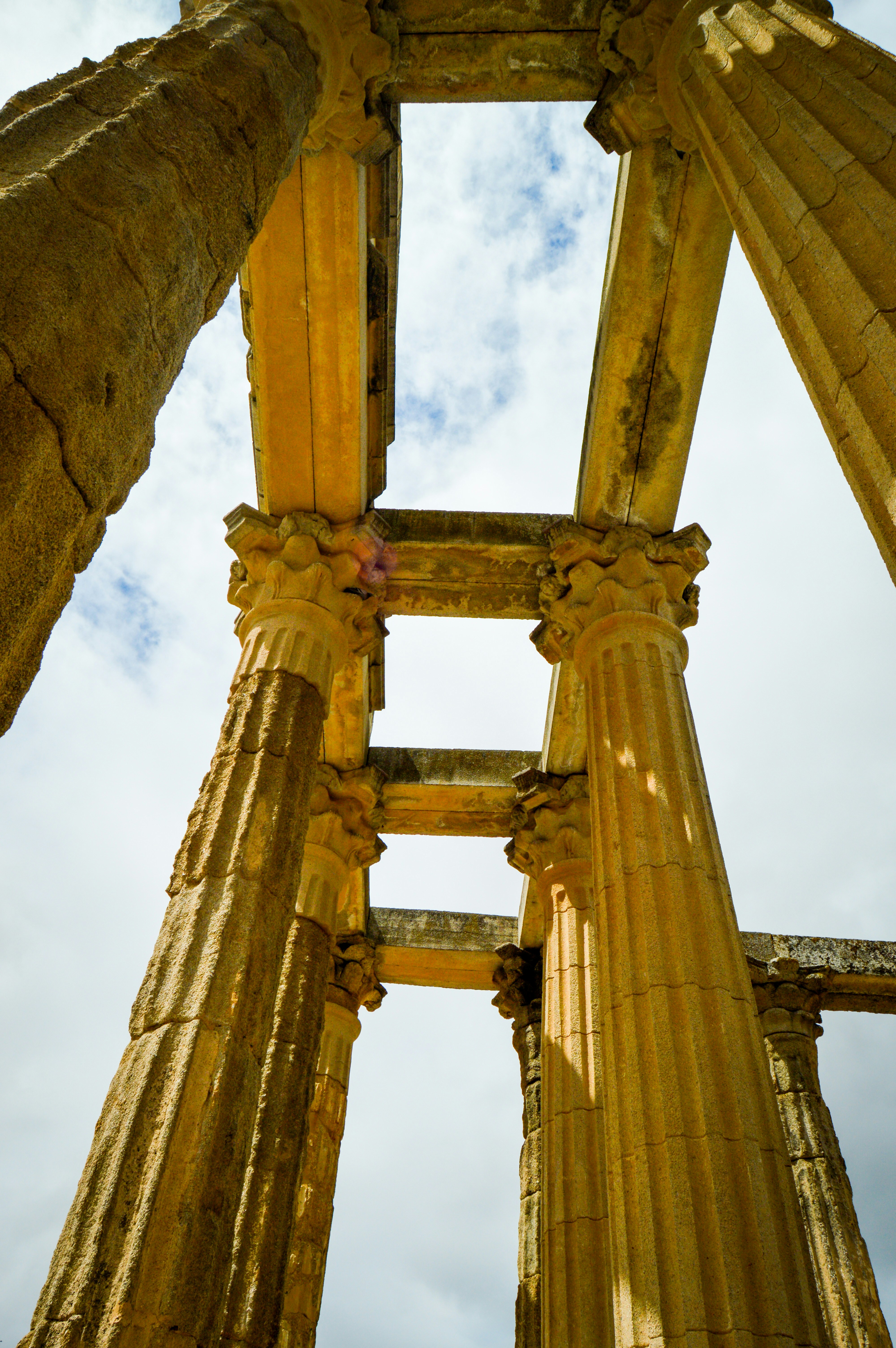Looking up at the columns of a building photo – Free Rome Image on Unsplash