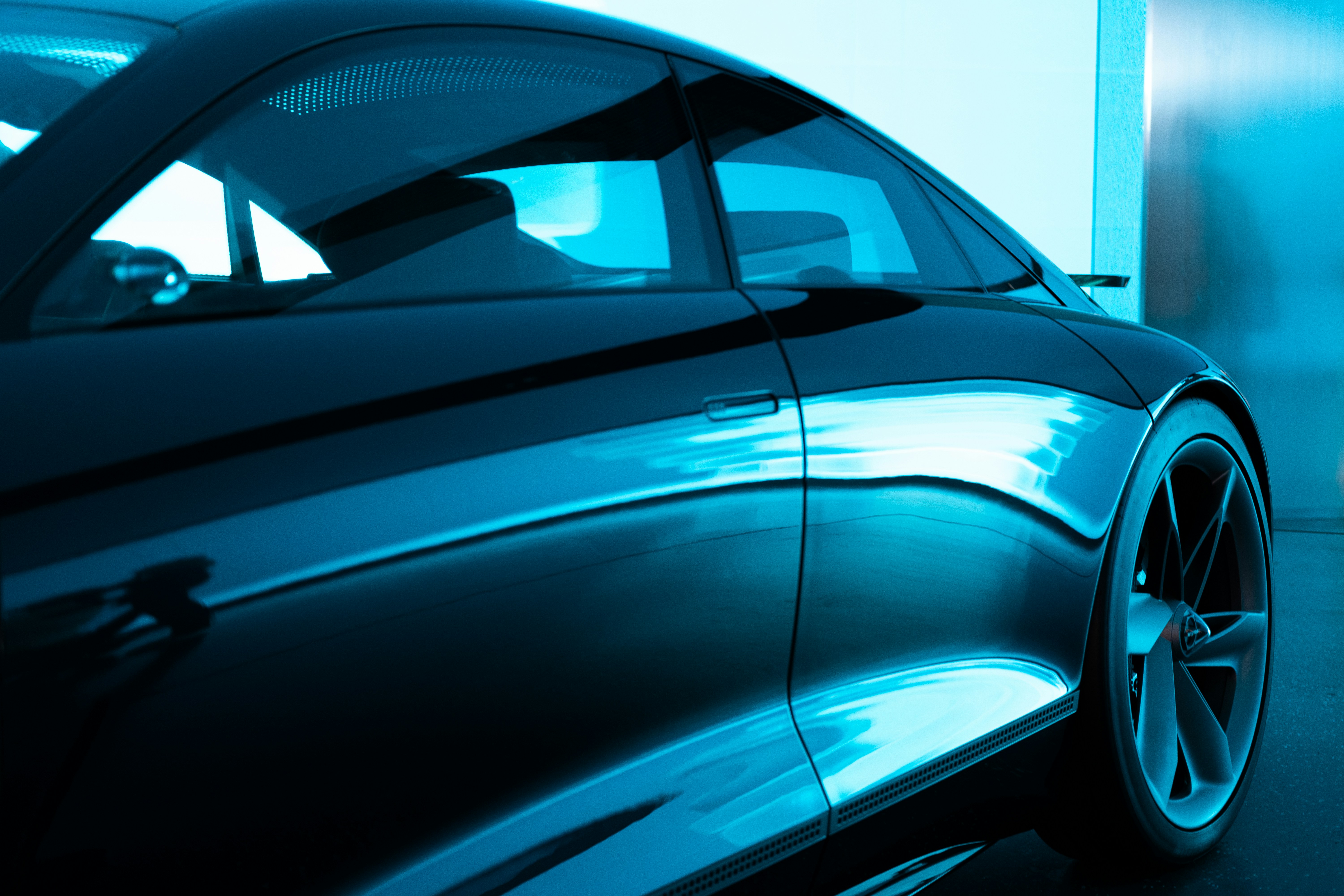 Cobalt Gleam: a sculpted coupe bathed in cobalt studio illumination