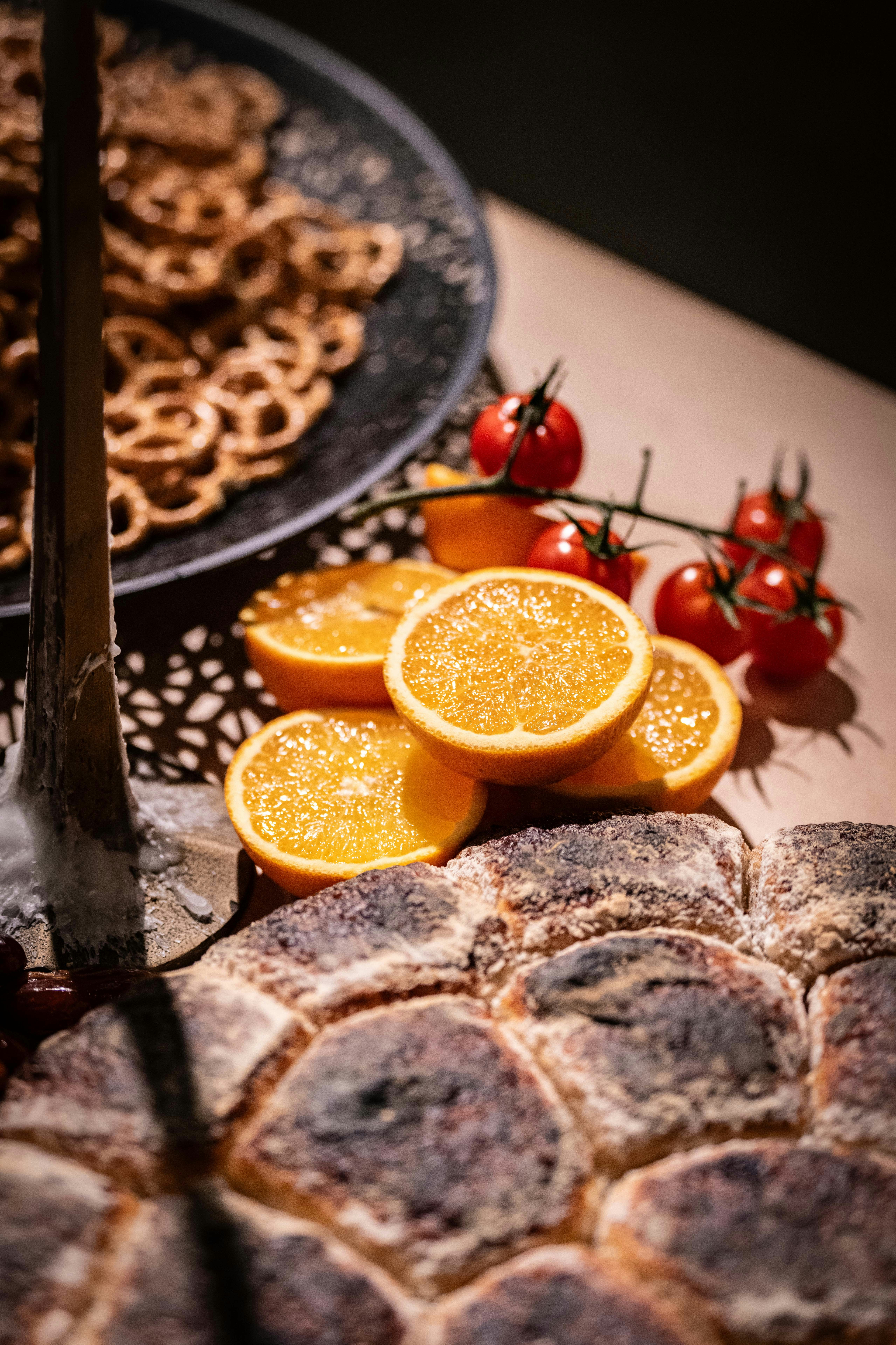 Citrus Ember: Orange Halves Framed by a Rustic Snack Portrait