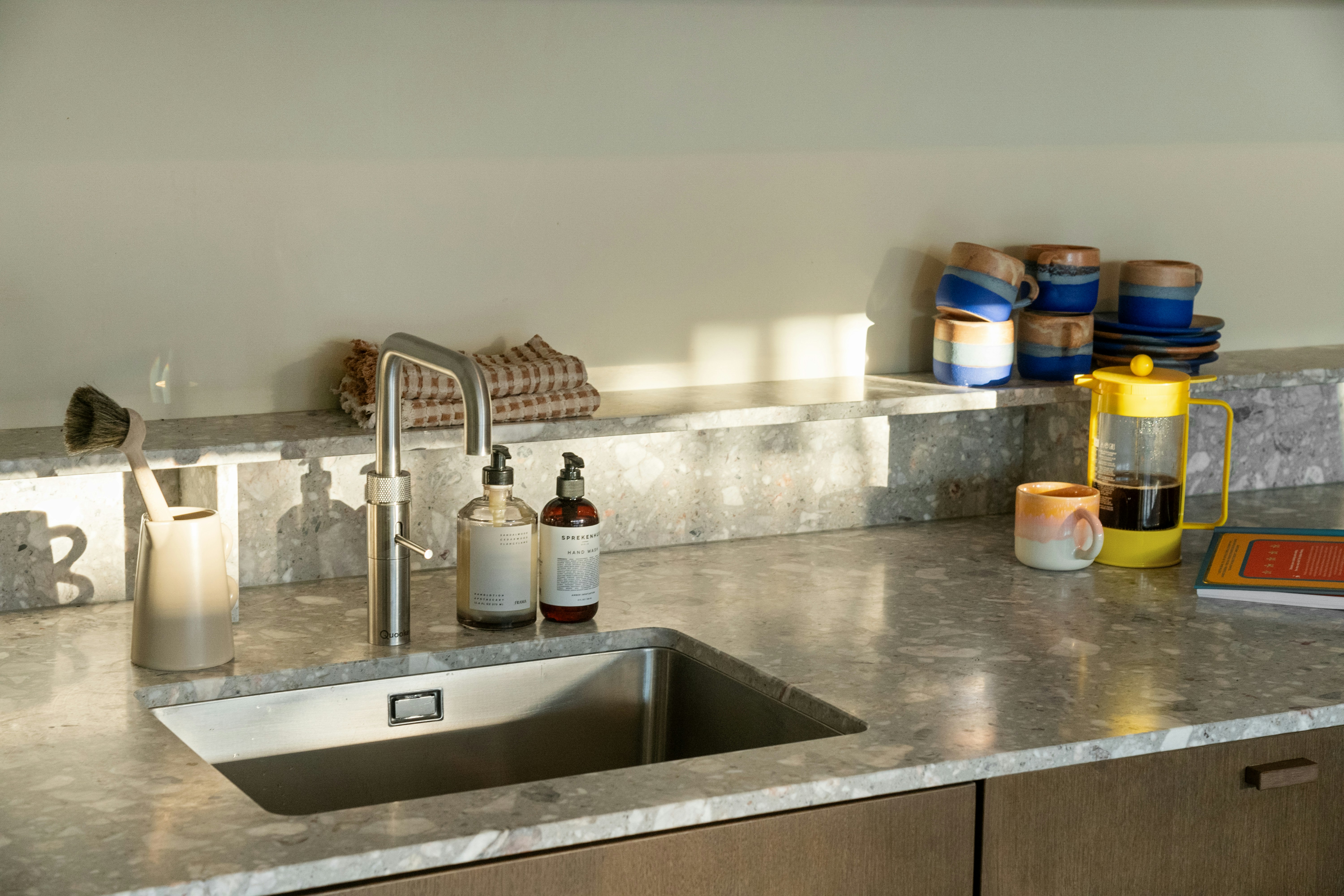A kitchen counter with a sink and a counter top photo – Free Kitchen ...