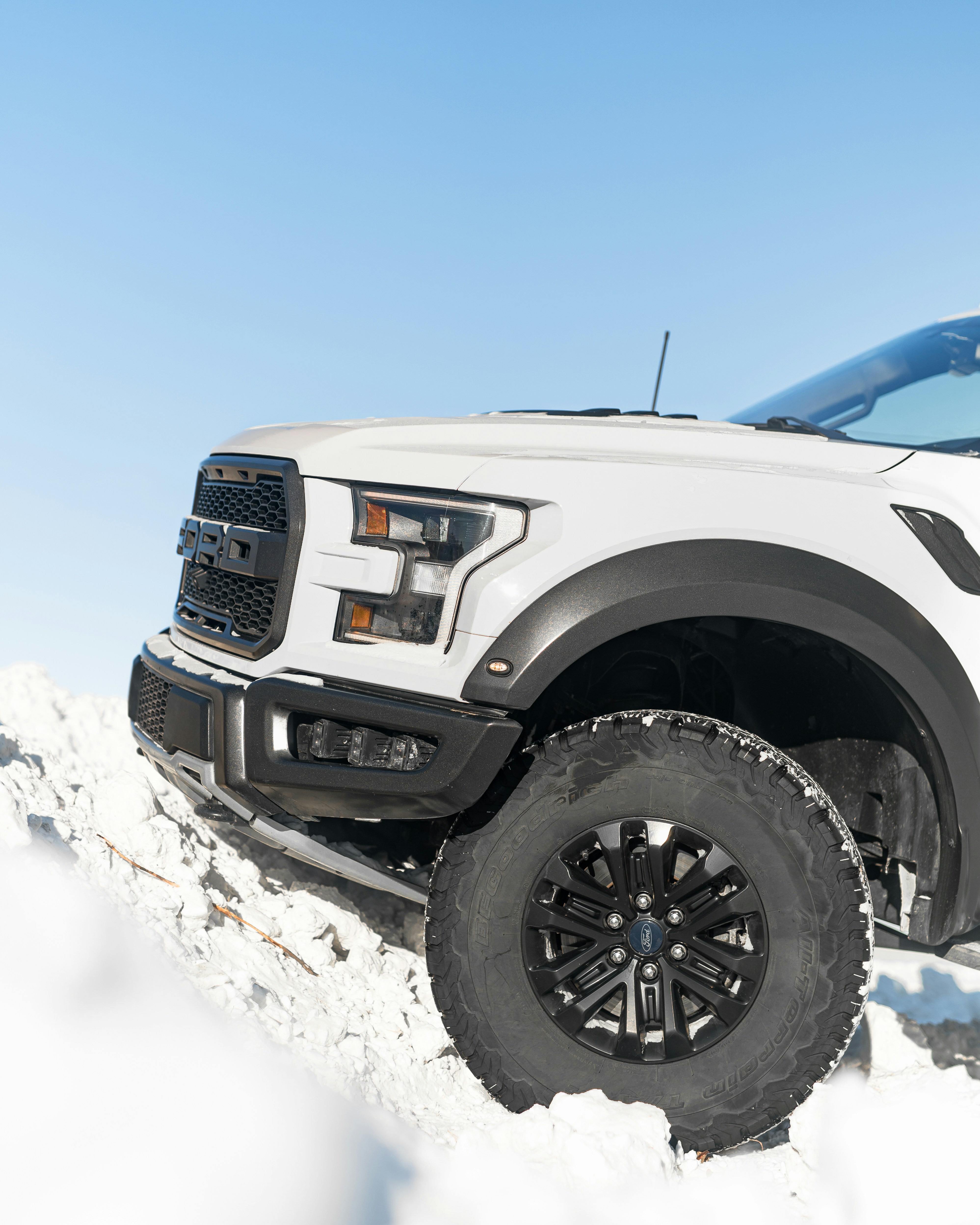 Snowbound Ford: Climbing a frosted ridge under a clear blue sky