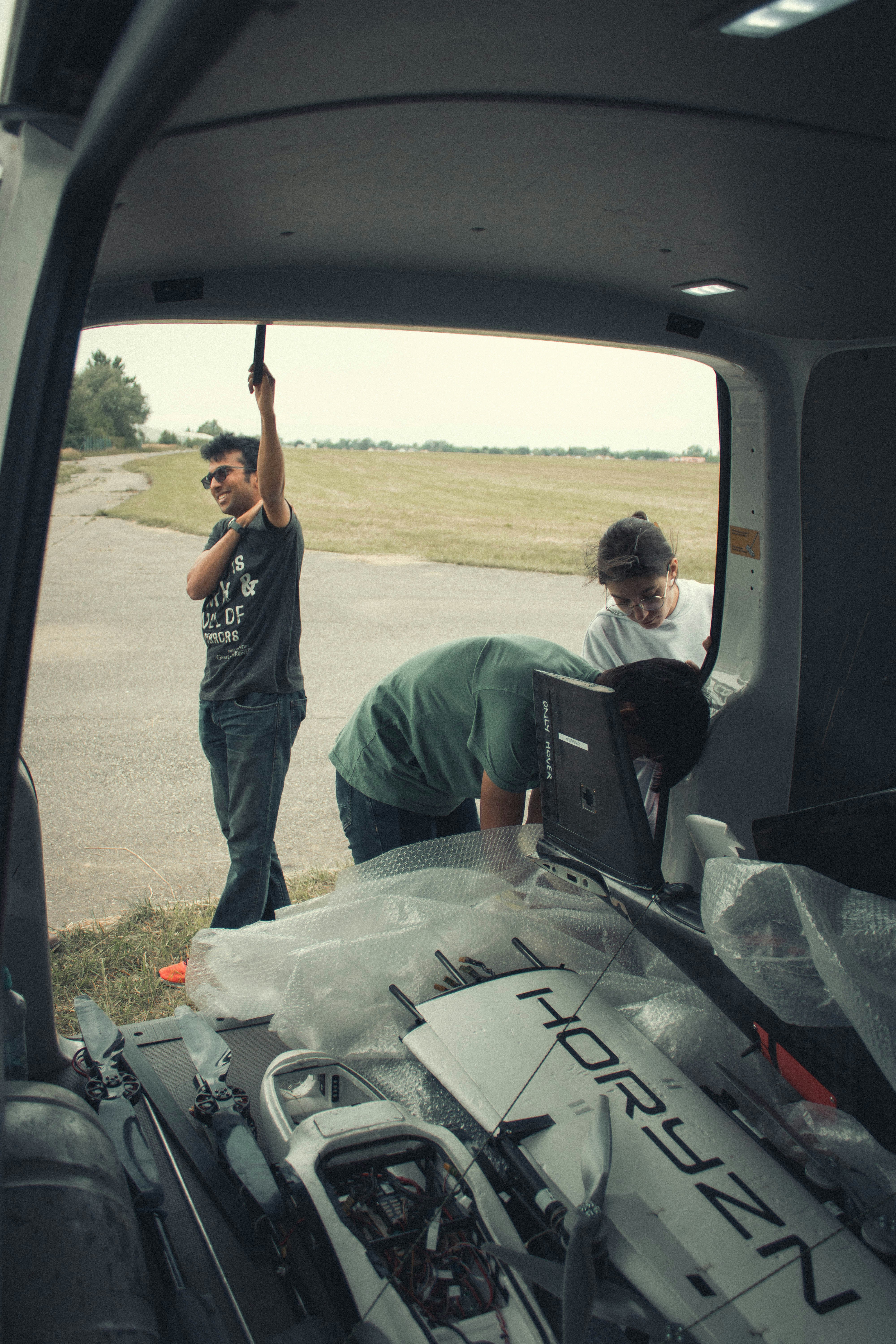 Hatchside Hustle: A Field Crew Pauses Over Gear