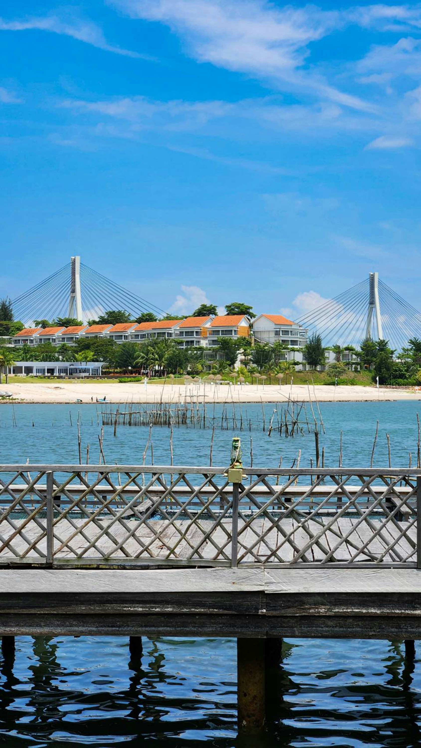 A pier with a view of a bridge in the background photo – Free Barelang ...
