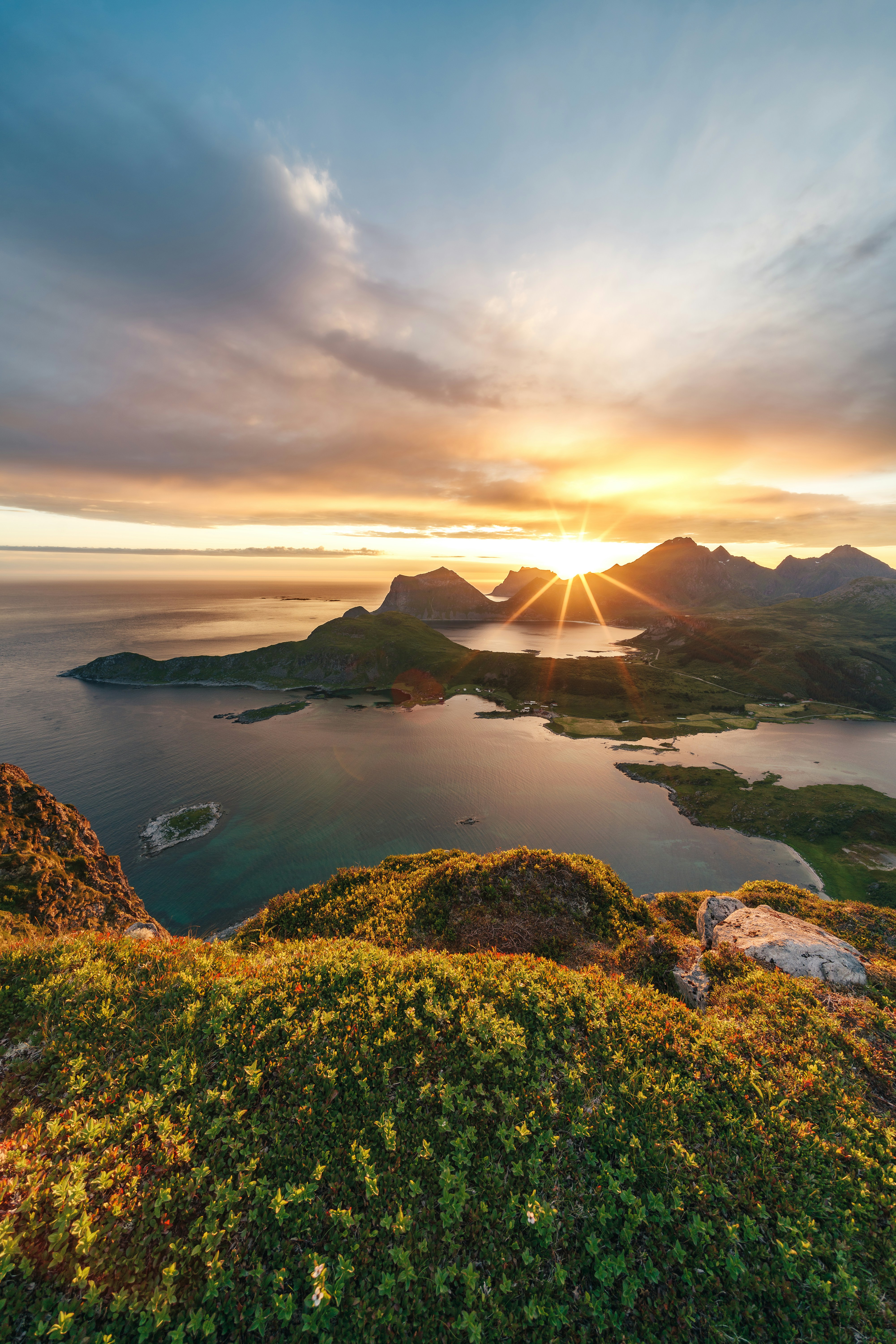 Sunburst Over Inner Fjord: Mountain Rim at Golden Hour