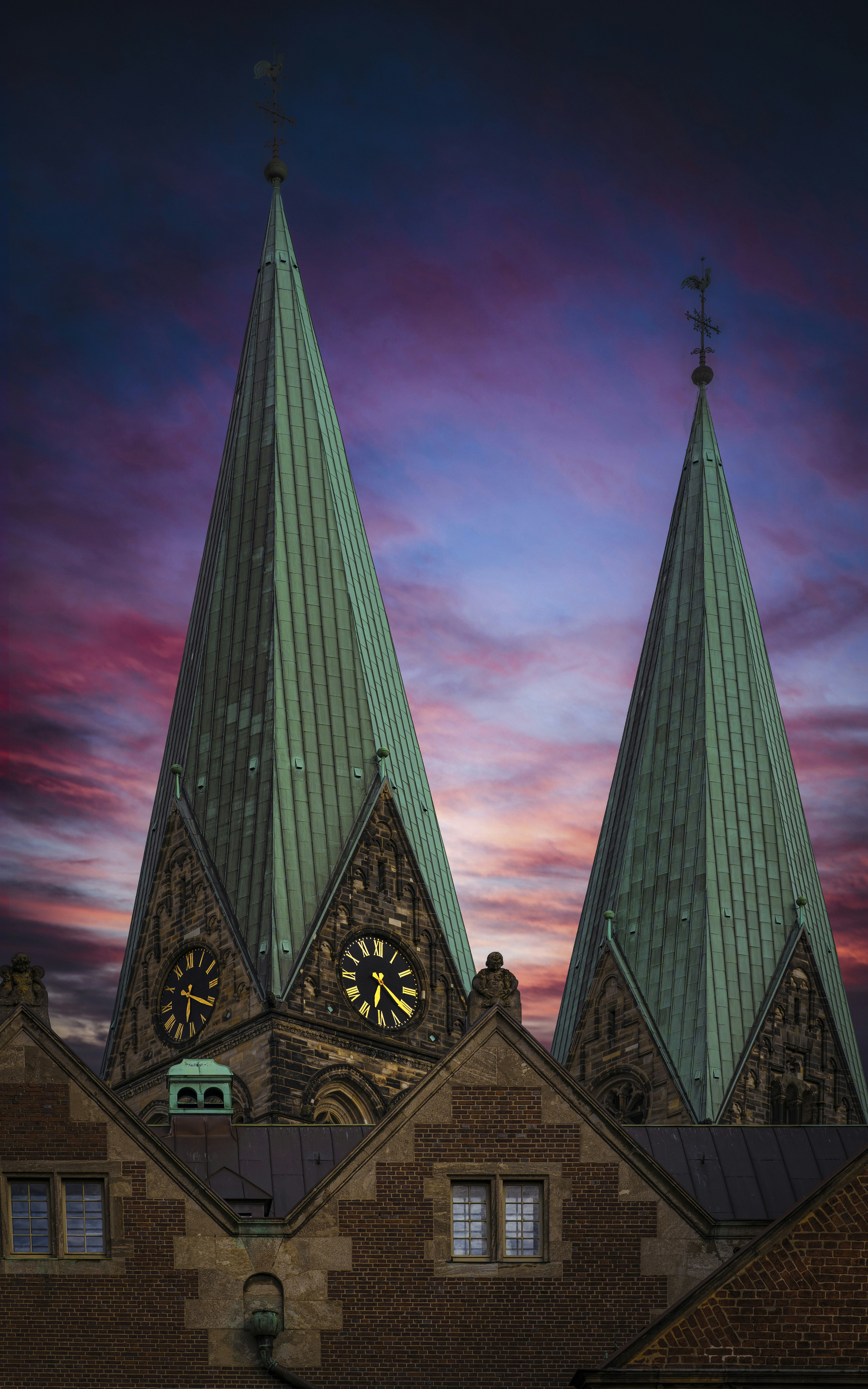 Twin Spires at Dusk: A Gothic Clocktower Silhouette