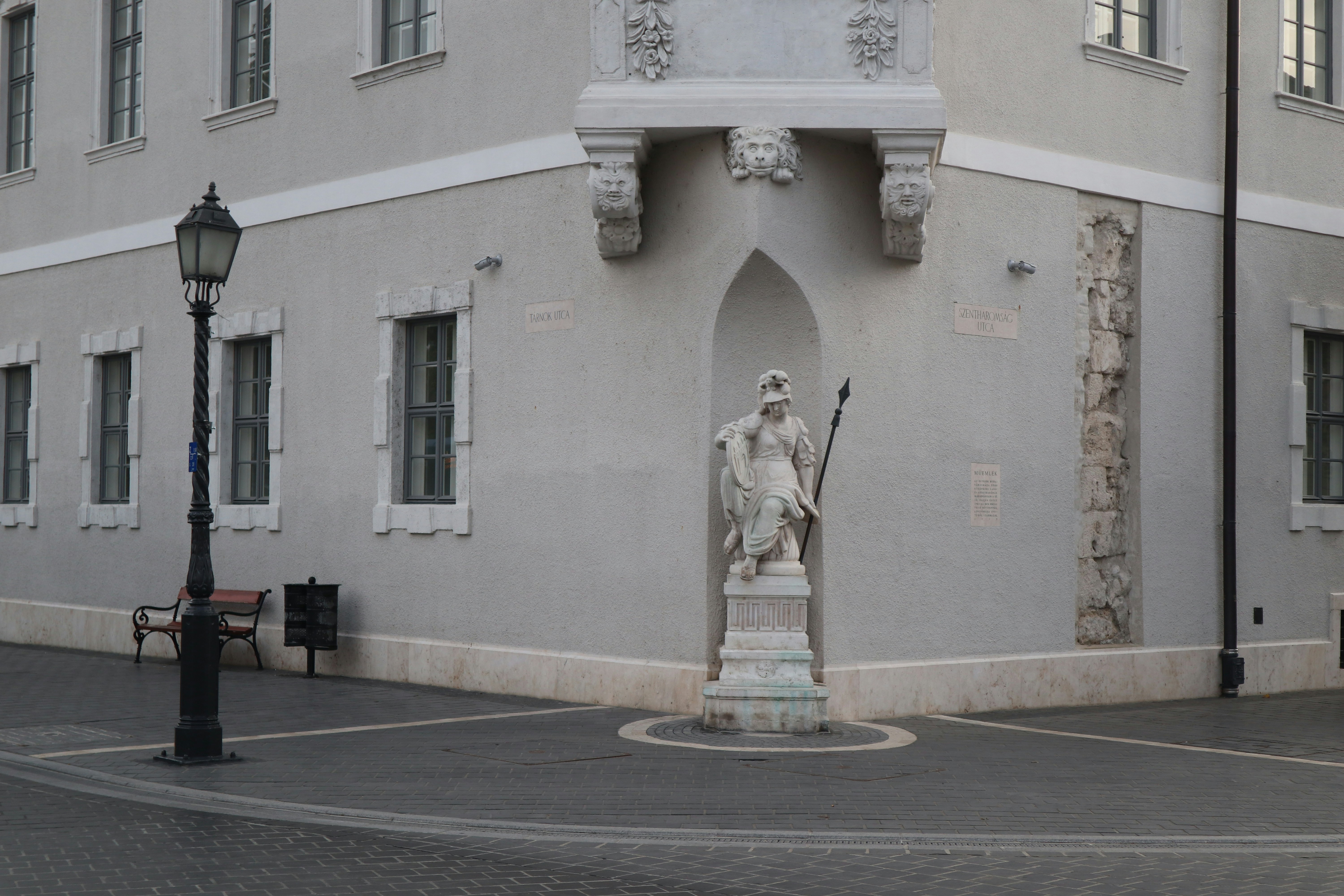 Stone Sentinel at a Quiet City Corner
