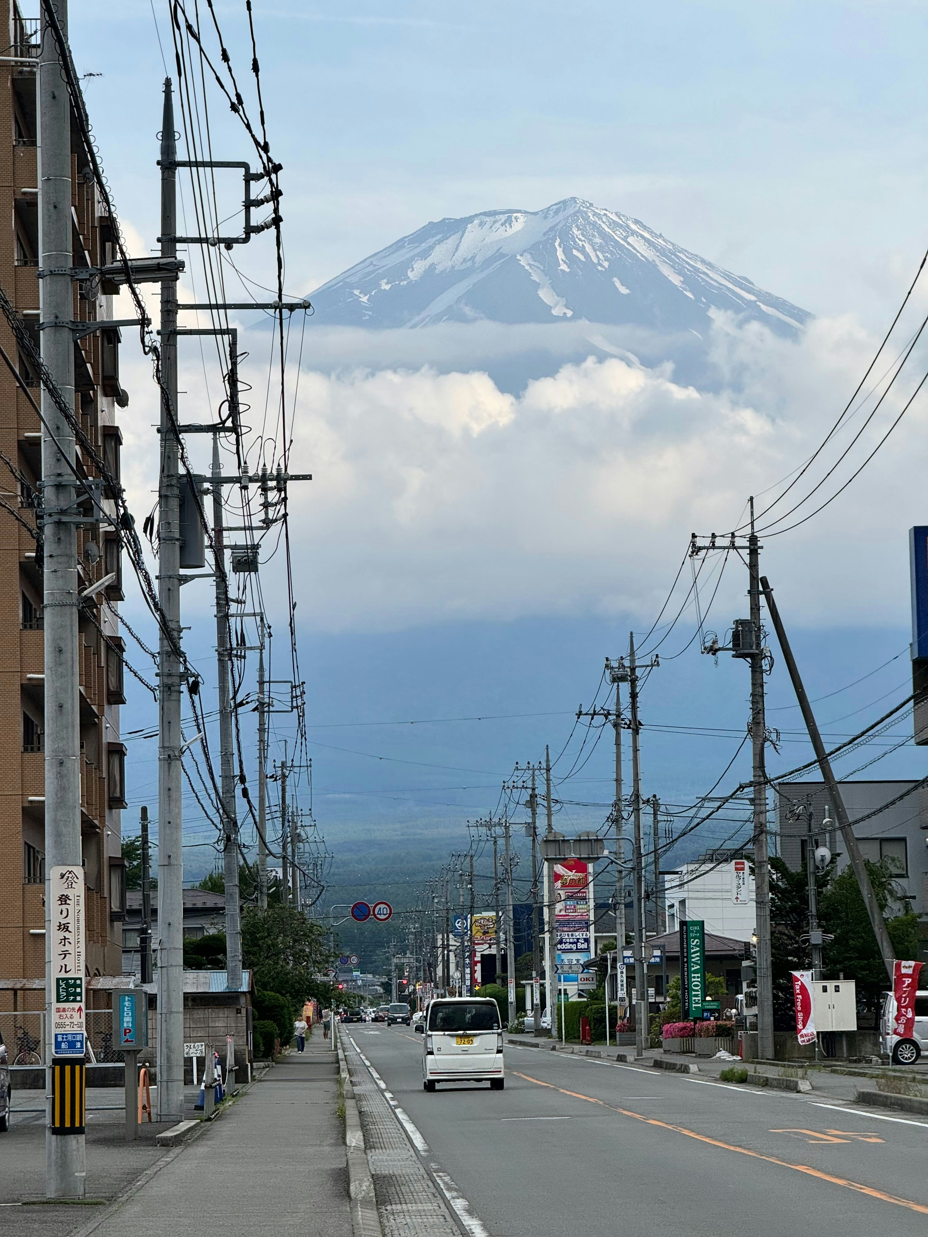 Mount Fuji | A city street with a mountain in the background