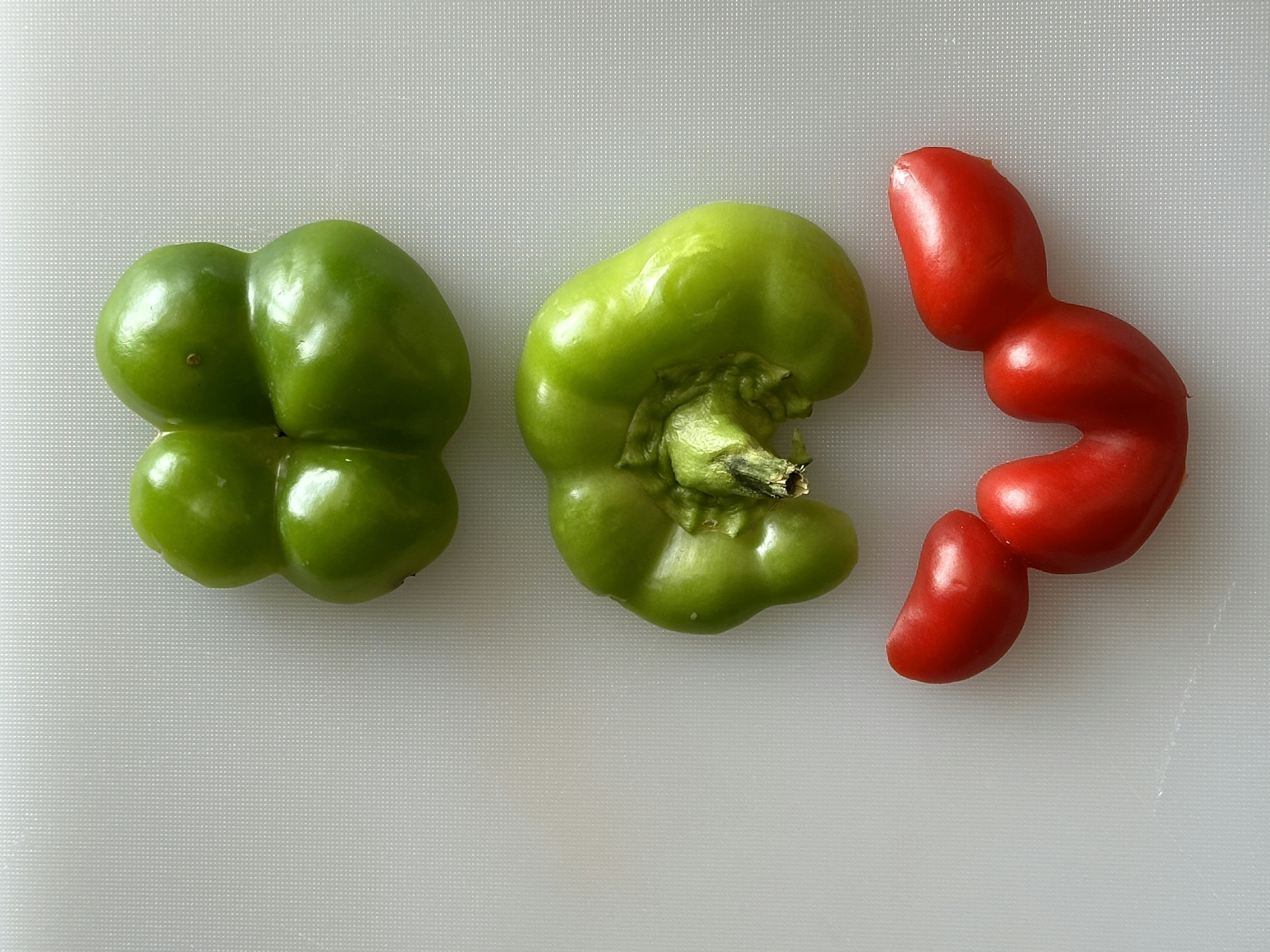 Whimsical Produce: A Playful Arrangement of Peppers