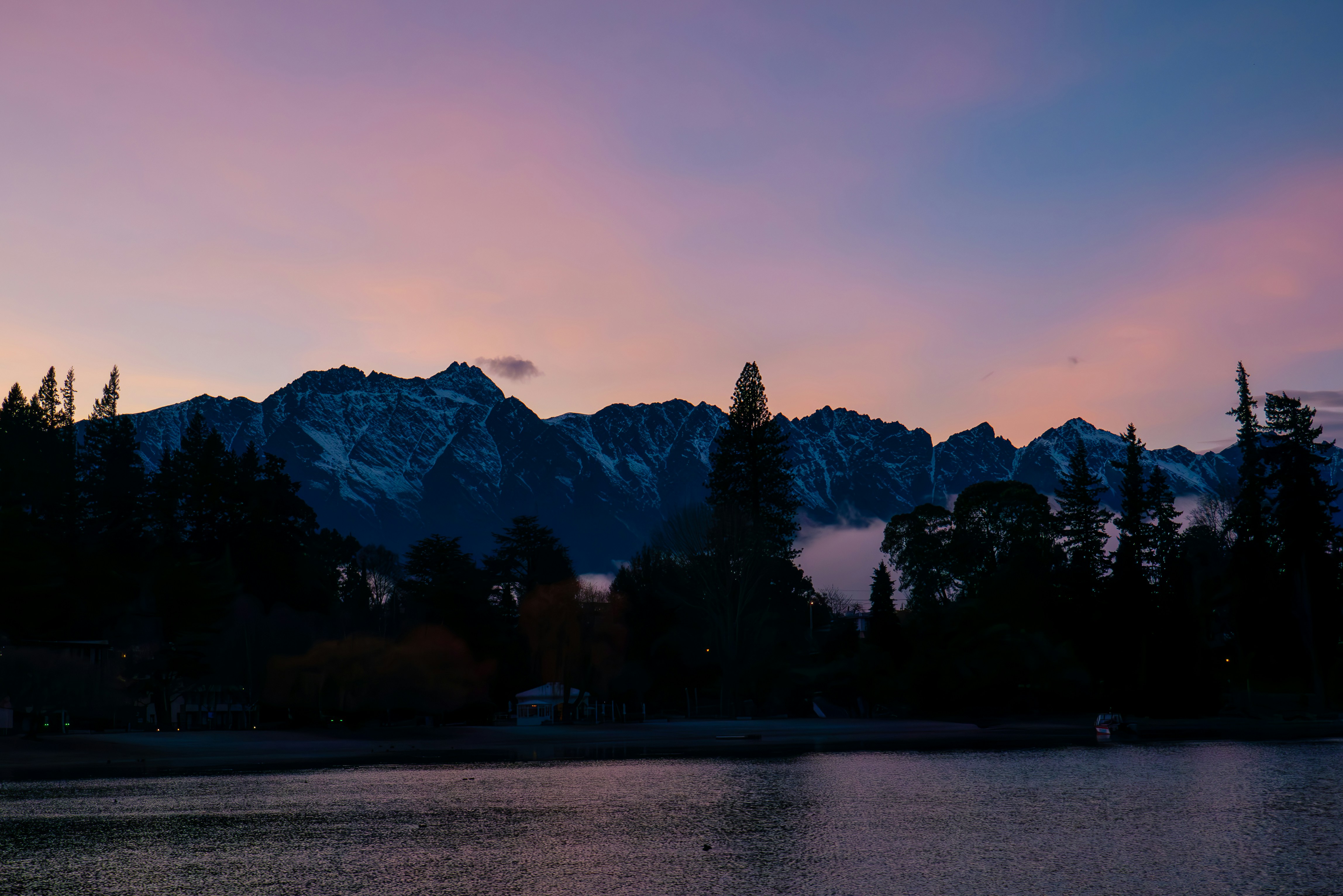 Crimson Hour Over Snowbound Peaks