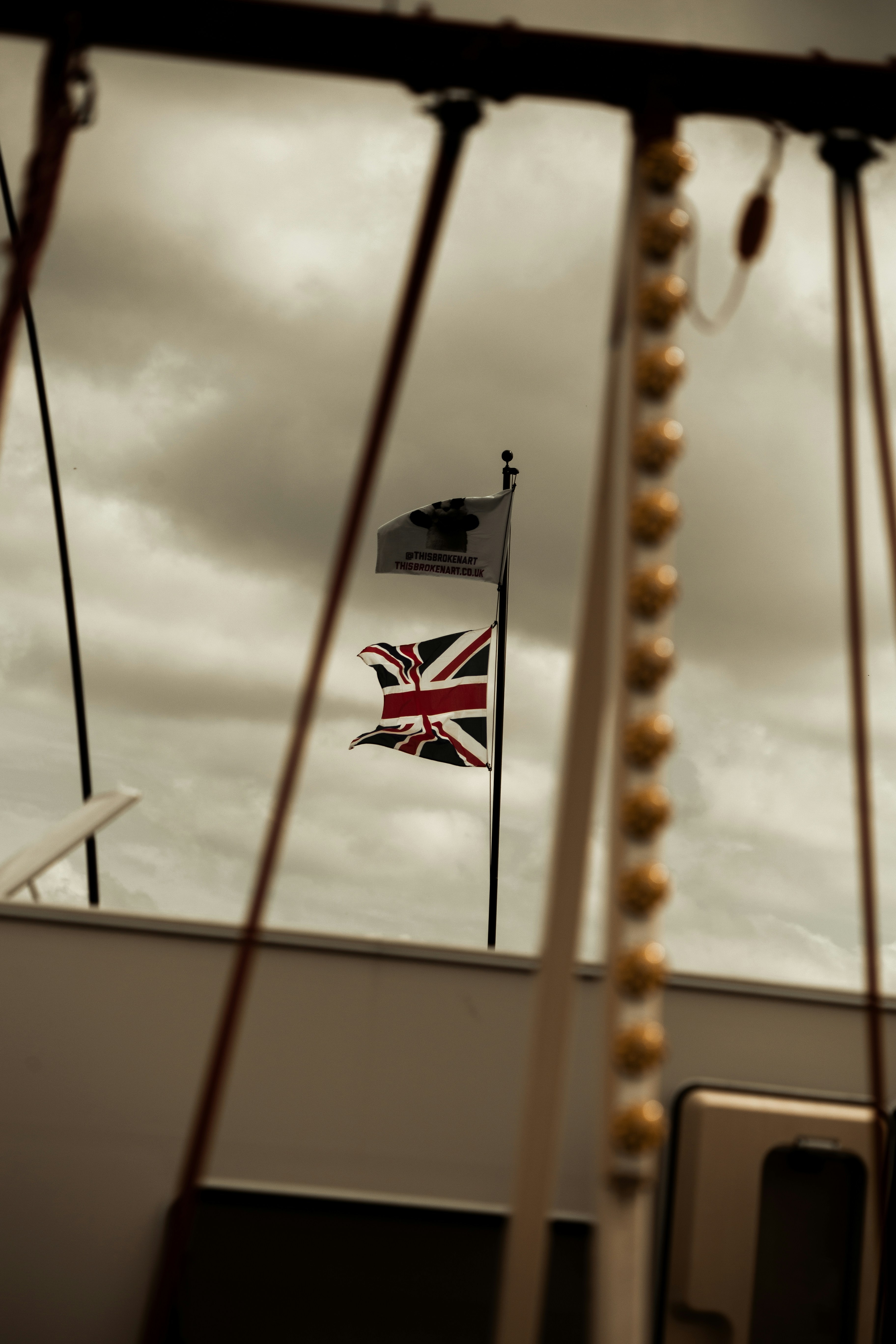 A british flag flying in the wind on a boat photo – Free Image on Unsplash