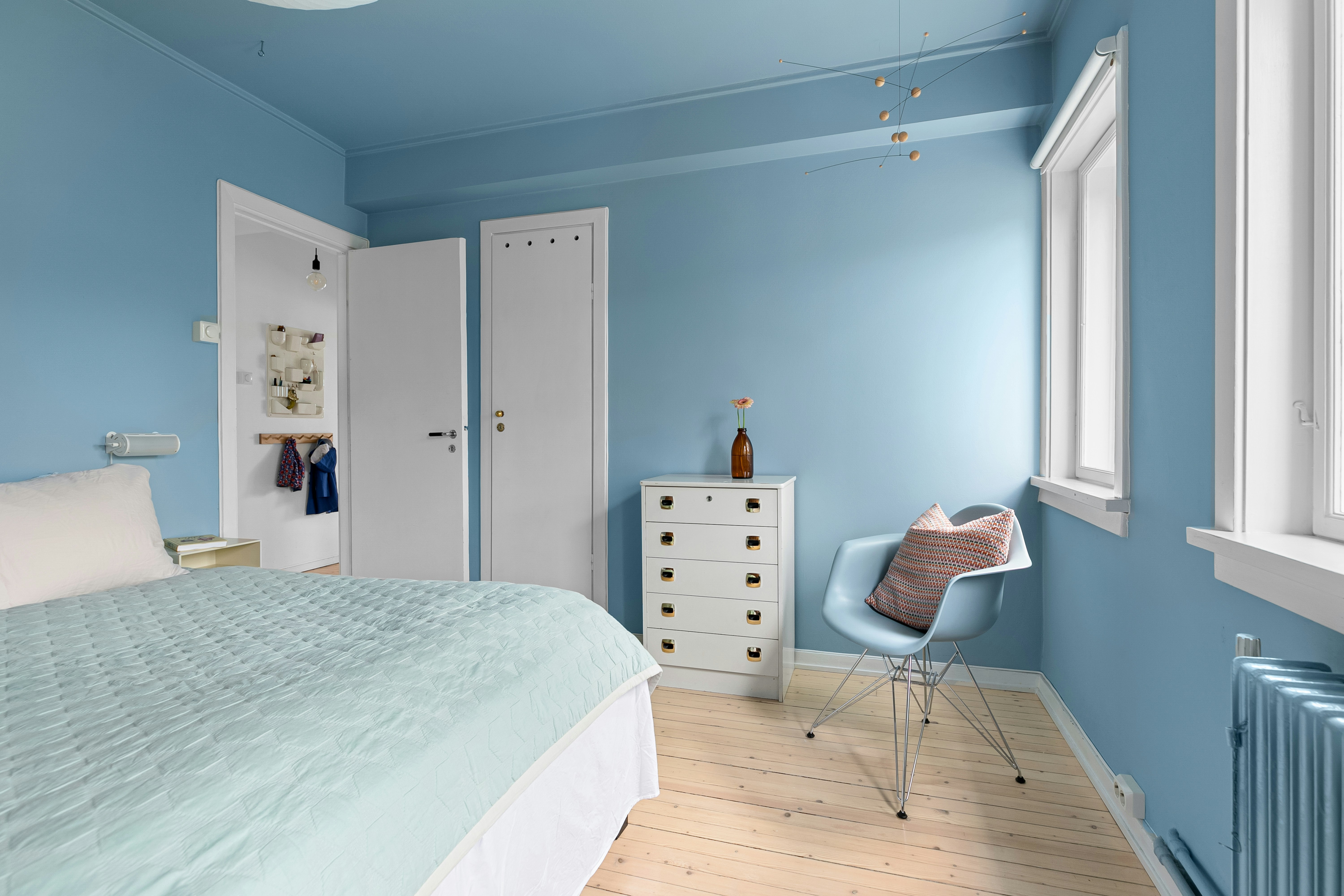 A bedroom with blue walls and white furniture photo – Free Image on ...