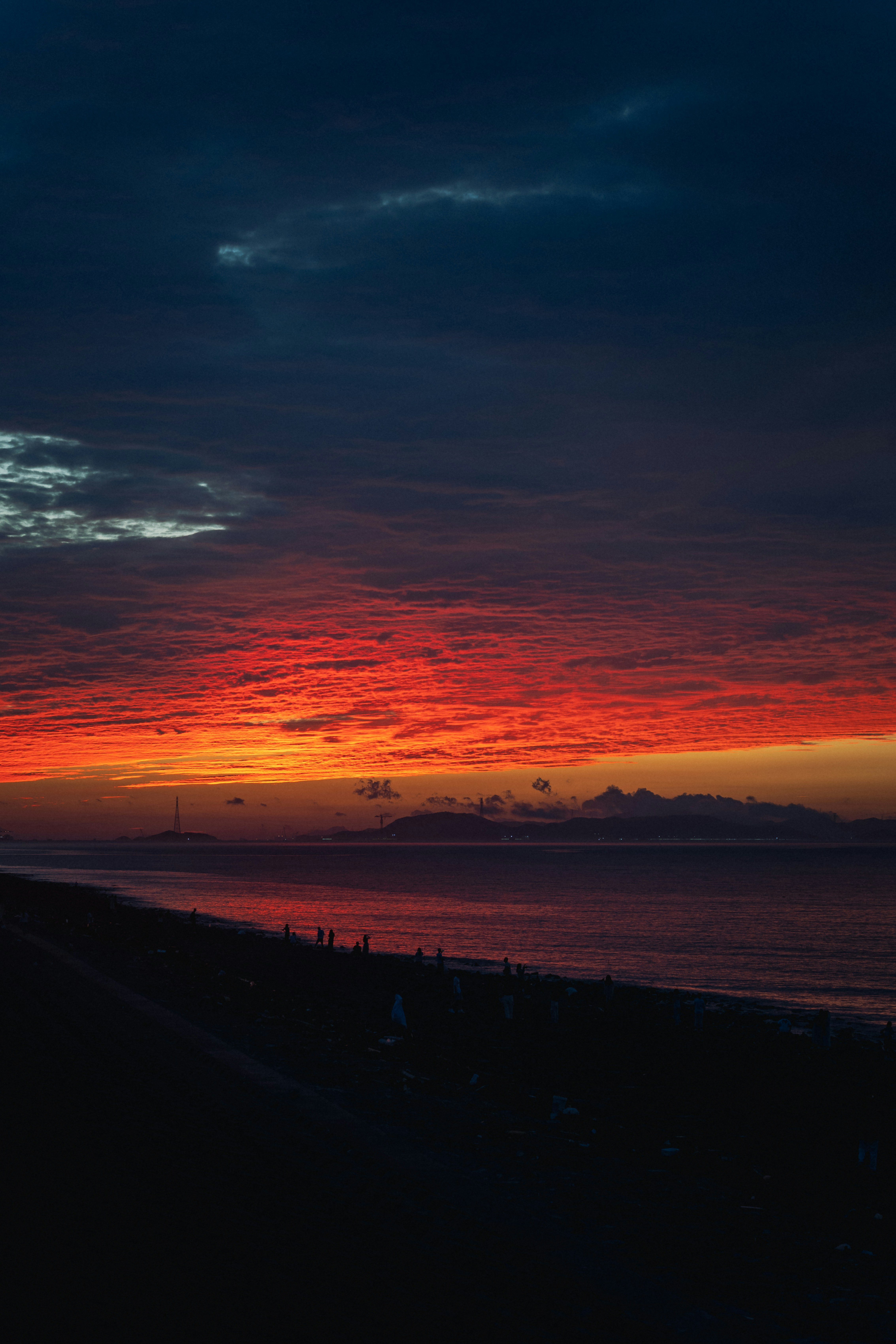 A red and blue sunset over the ocean photo – Free Image on Unsplash