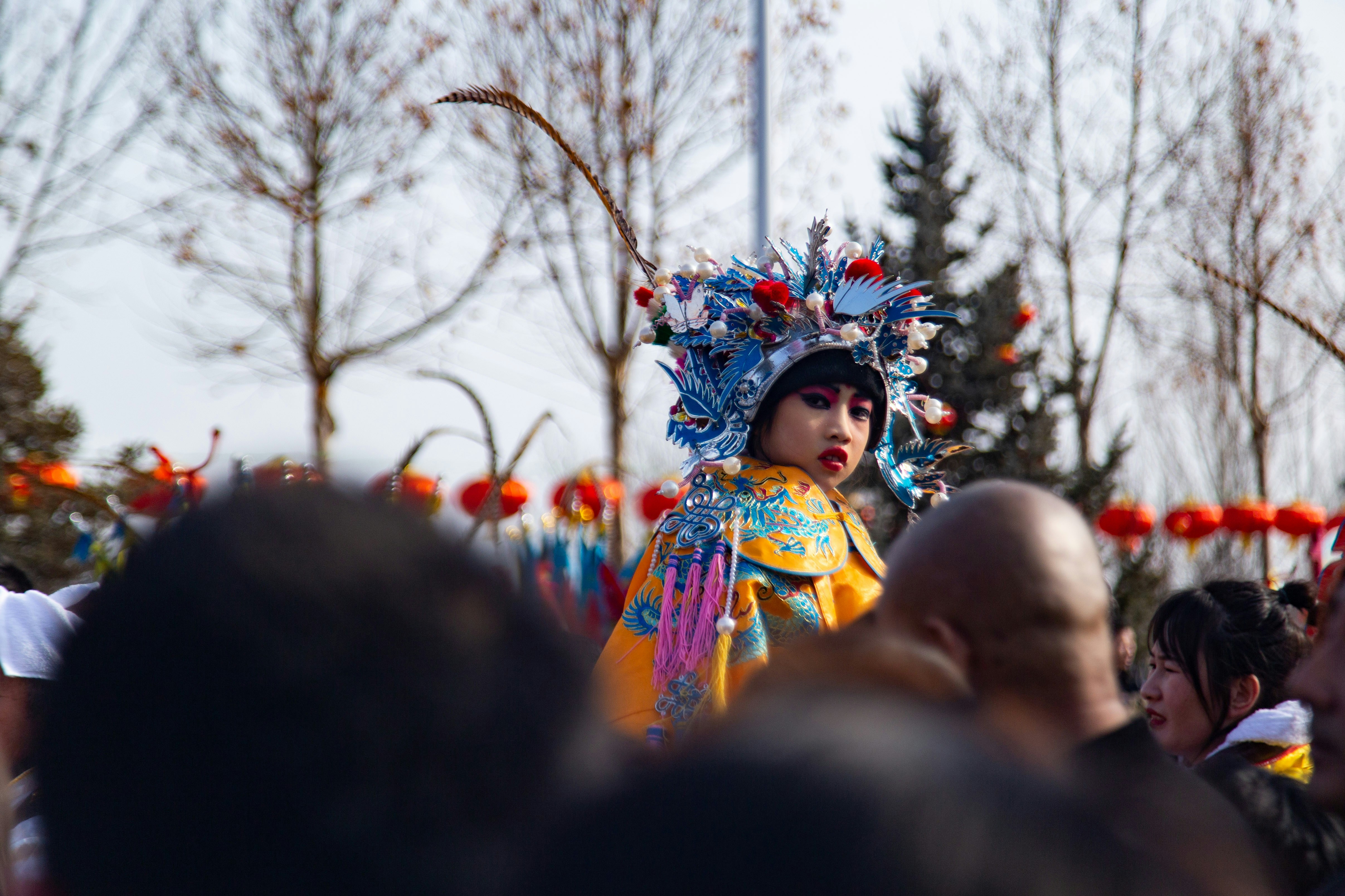 Chromatic Headdress: A Festive Portrait in Colorful Garb