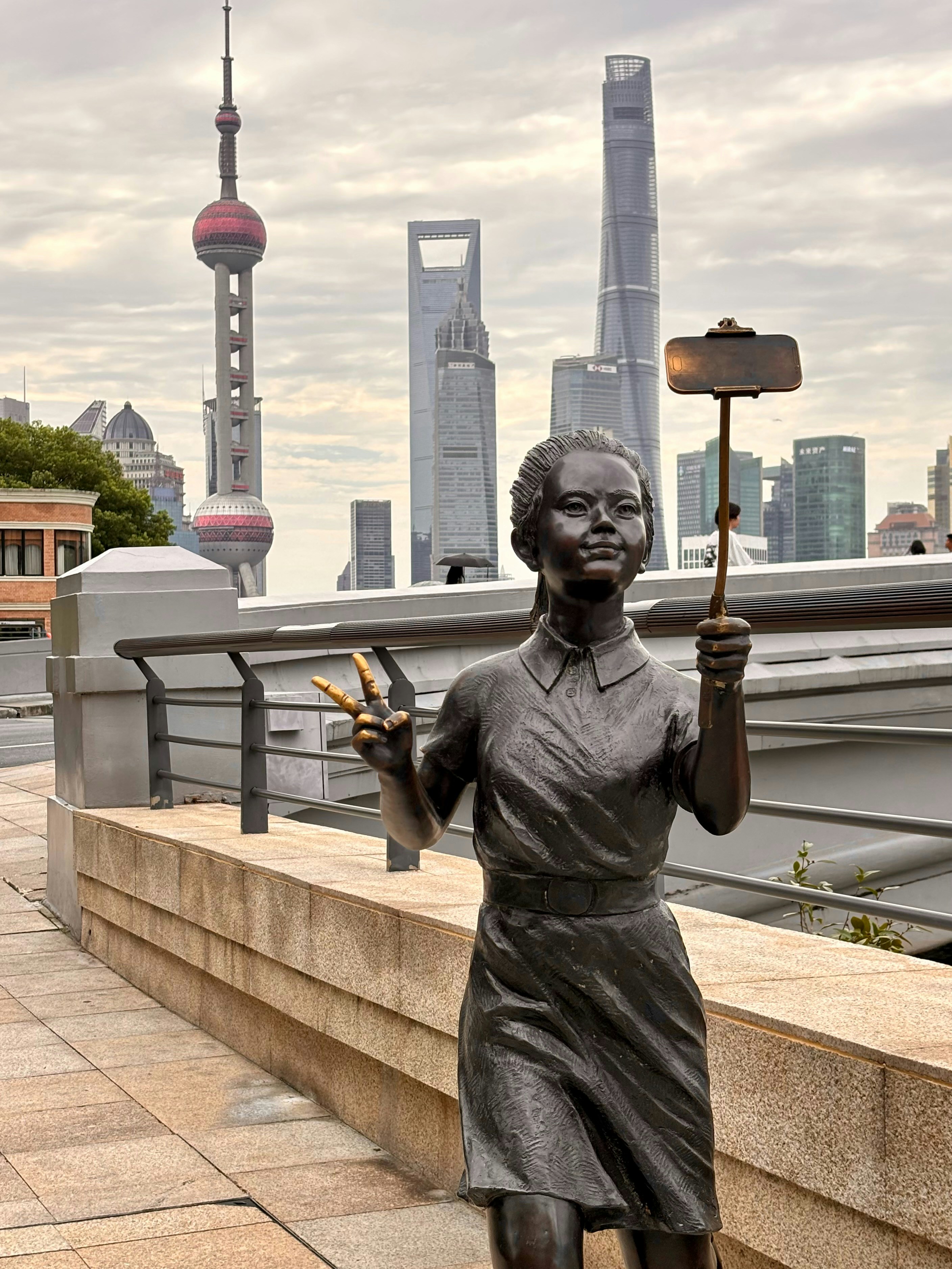 Bronze Girl at the Bund: Framing Shanghai's Skyscraper Silhouette