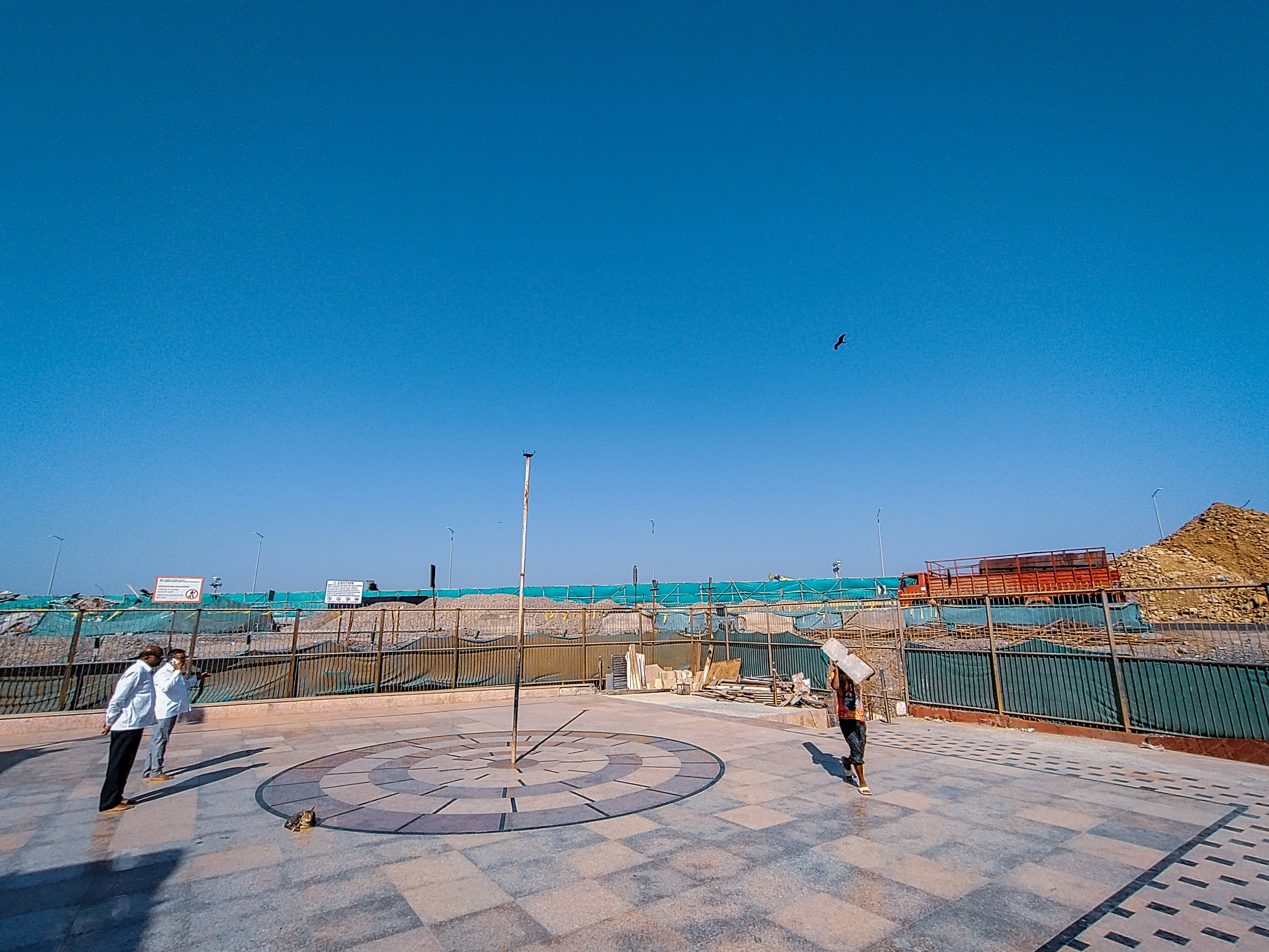 Circle of Settlement: A Quiet Plaza Under Construction