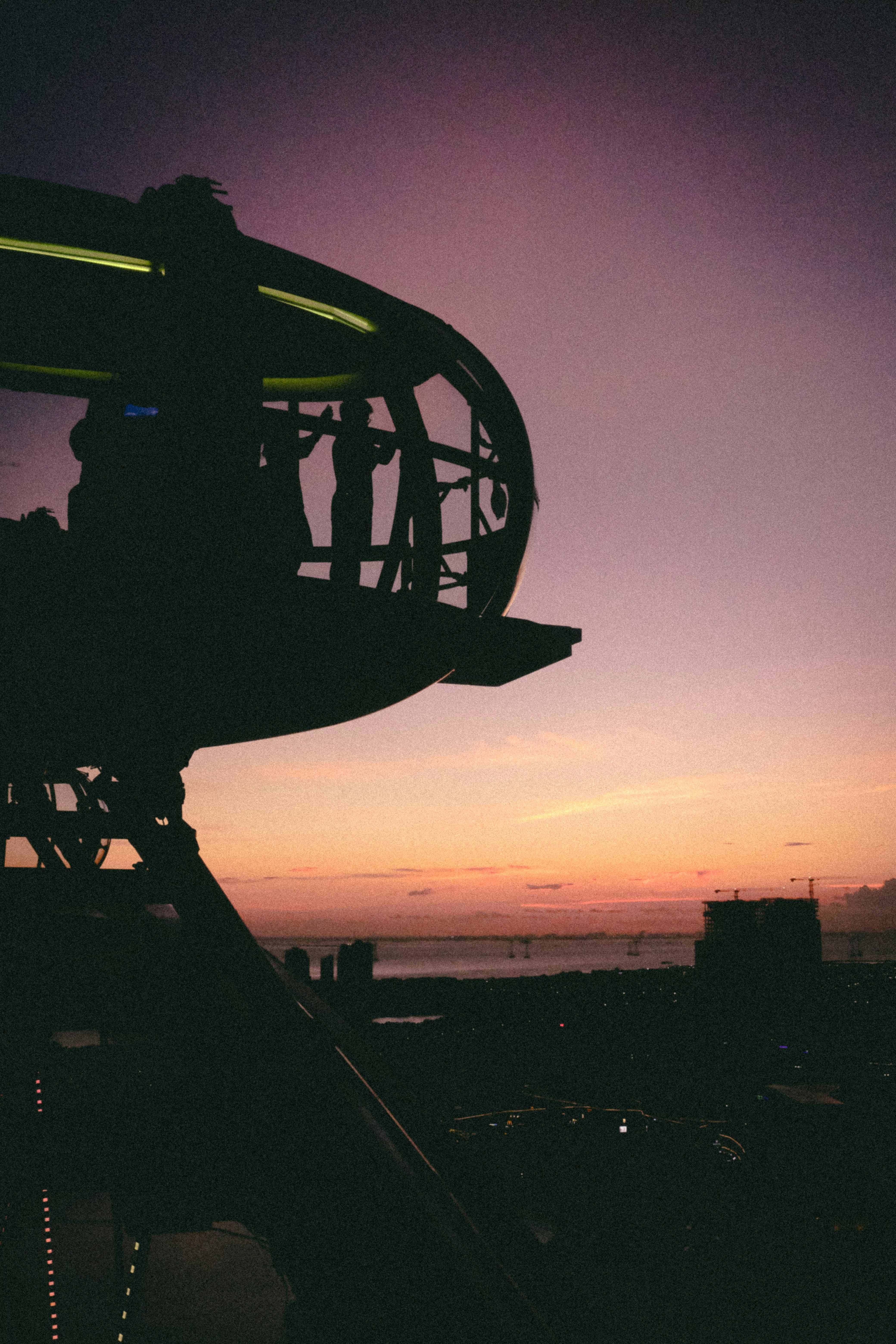 Saturnine Gaze: A Telescopic Dome Framed by Sunset Seascape