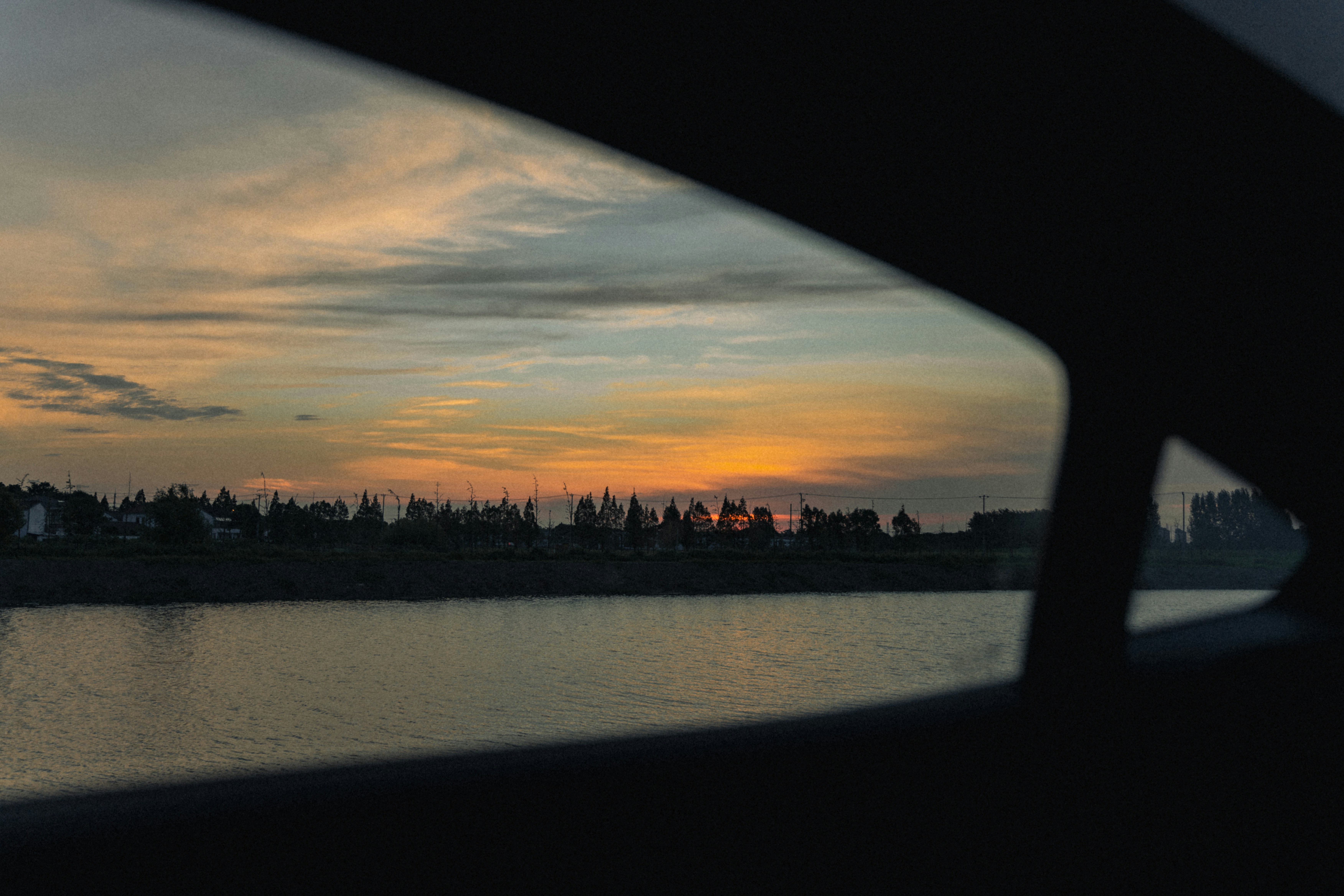 A view of a sunset from a car window photo – Free Nature Image on Unsplash