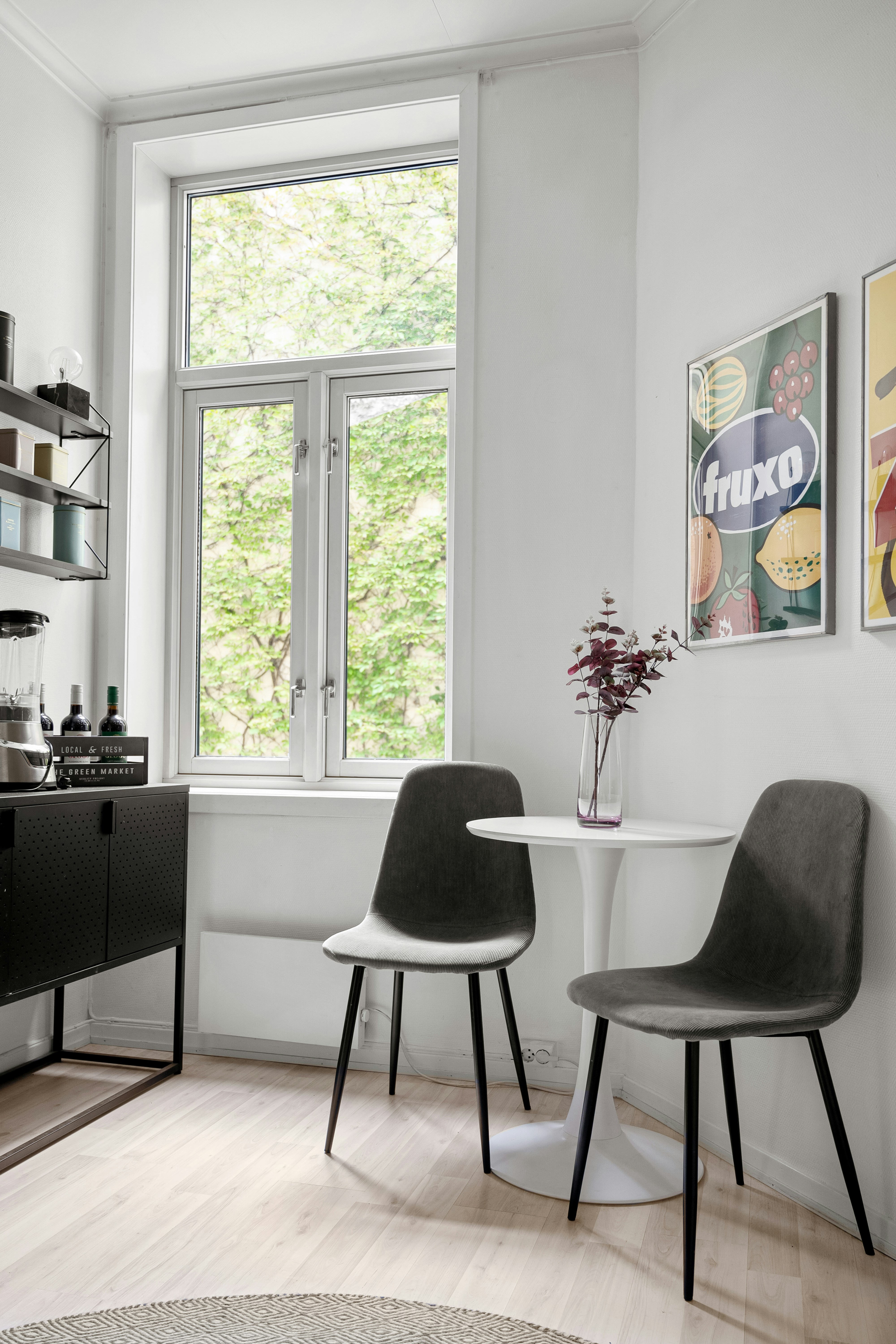 A kitchen with two chairs and a table photo – Free Art Image on Unsplash