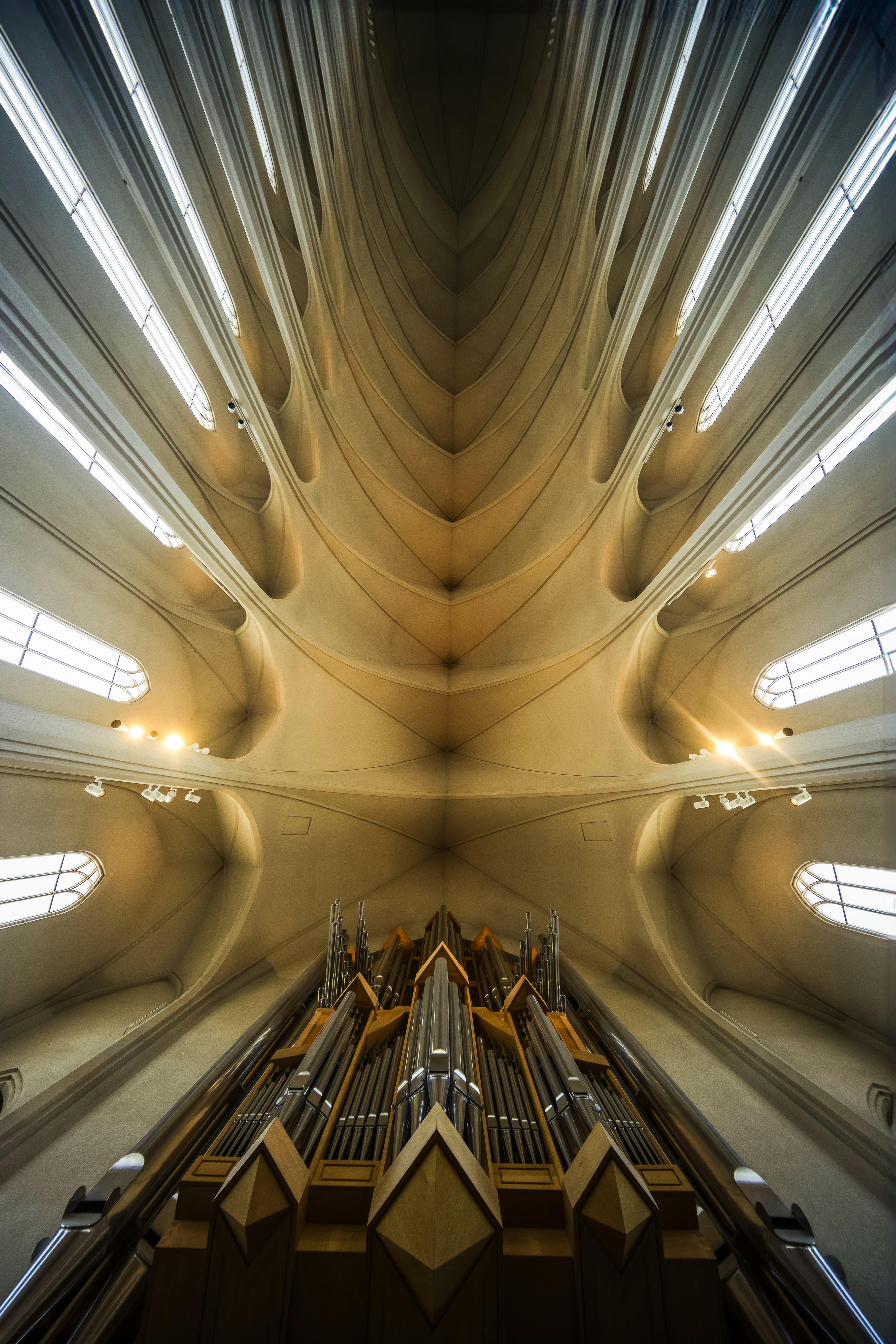A large pipe in the middle of a building photo – Free Iceland Image on ...