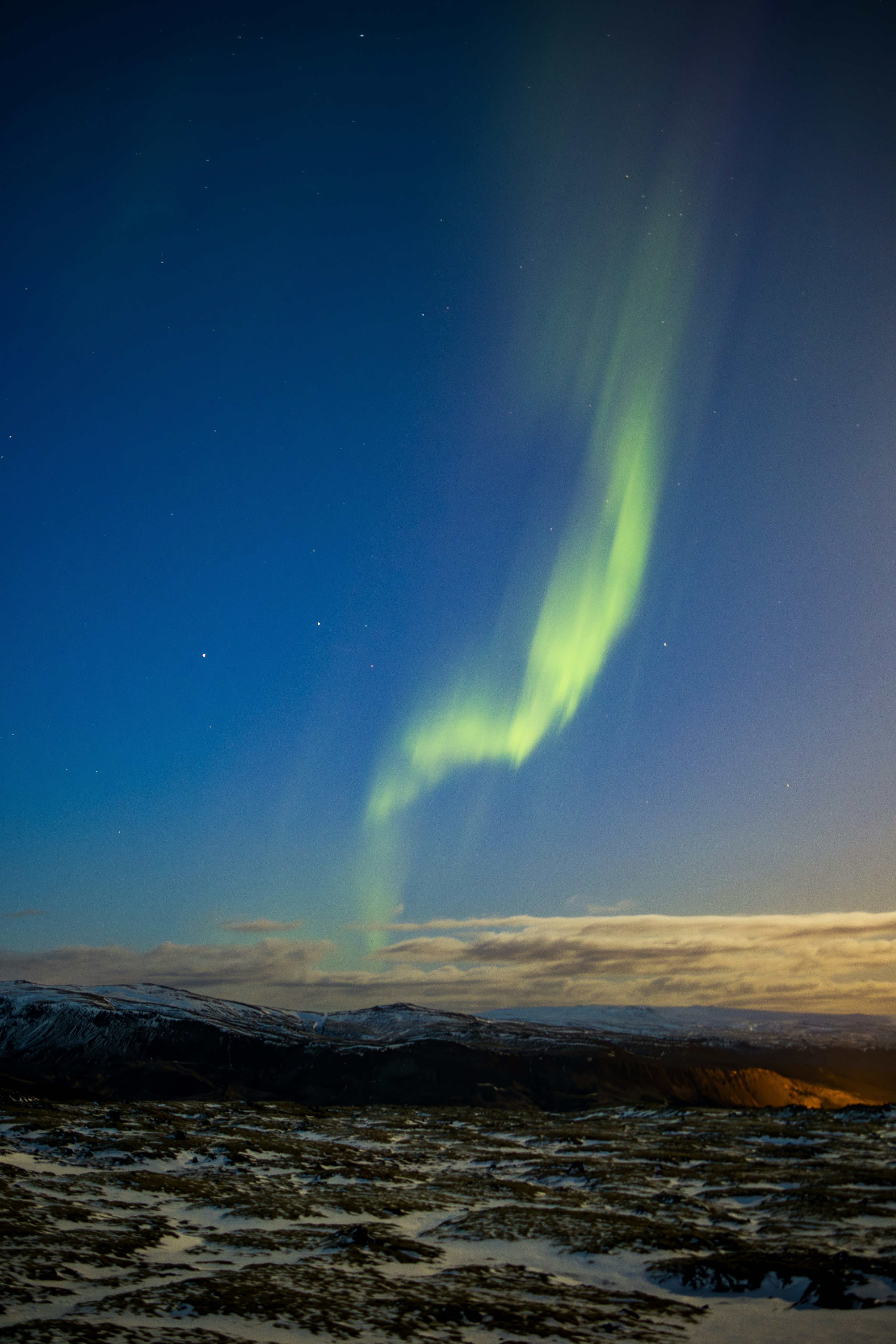 Azure Veil: Night Aurora Over Snowfield Ridge