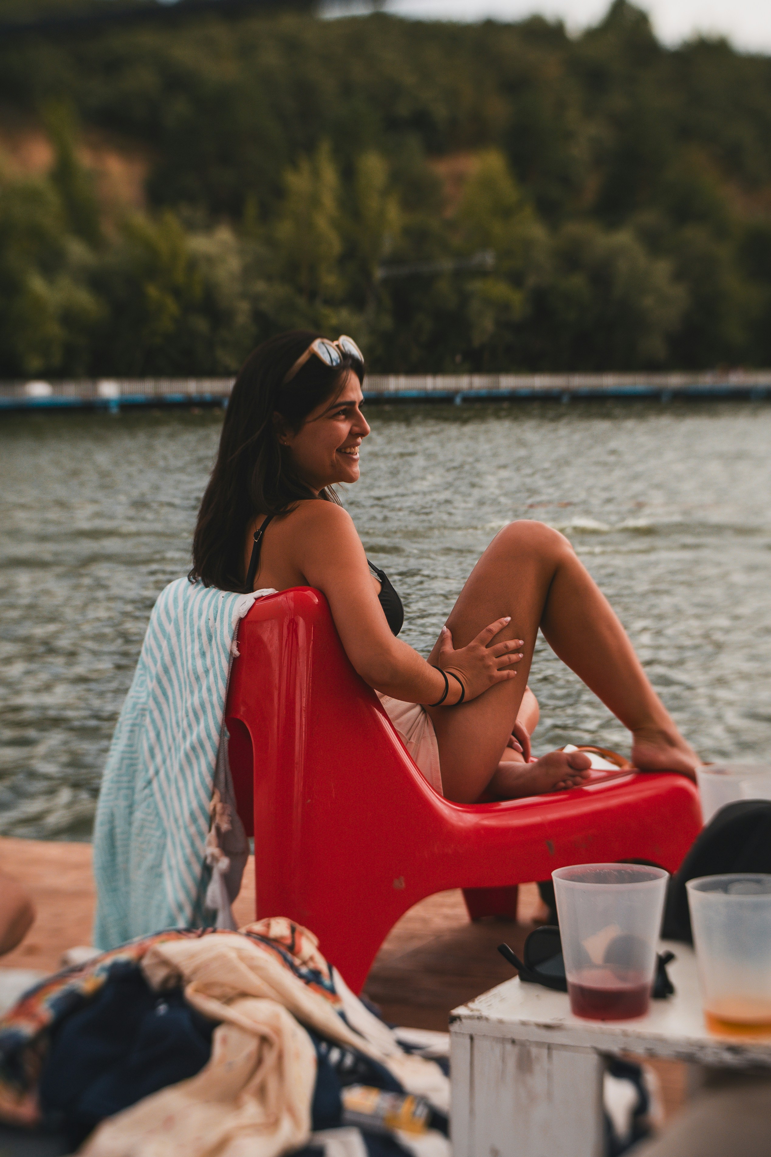 Sunlit shoreline chair: a carefree moment by the water