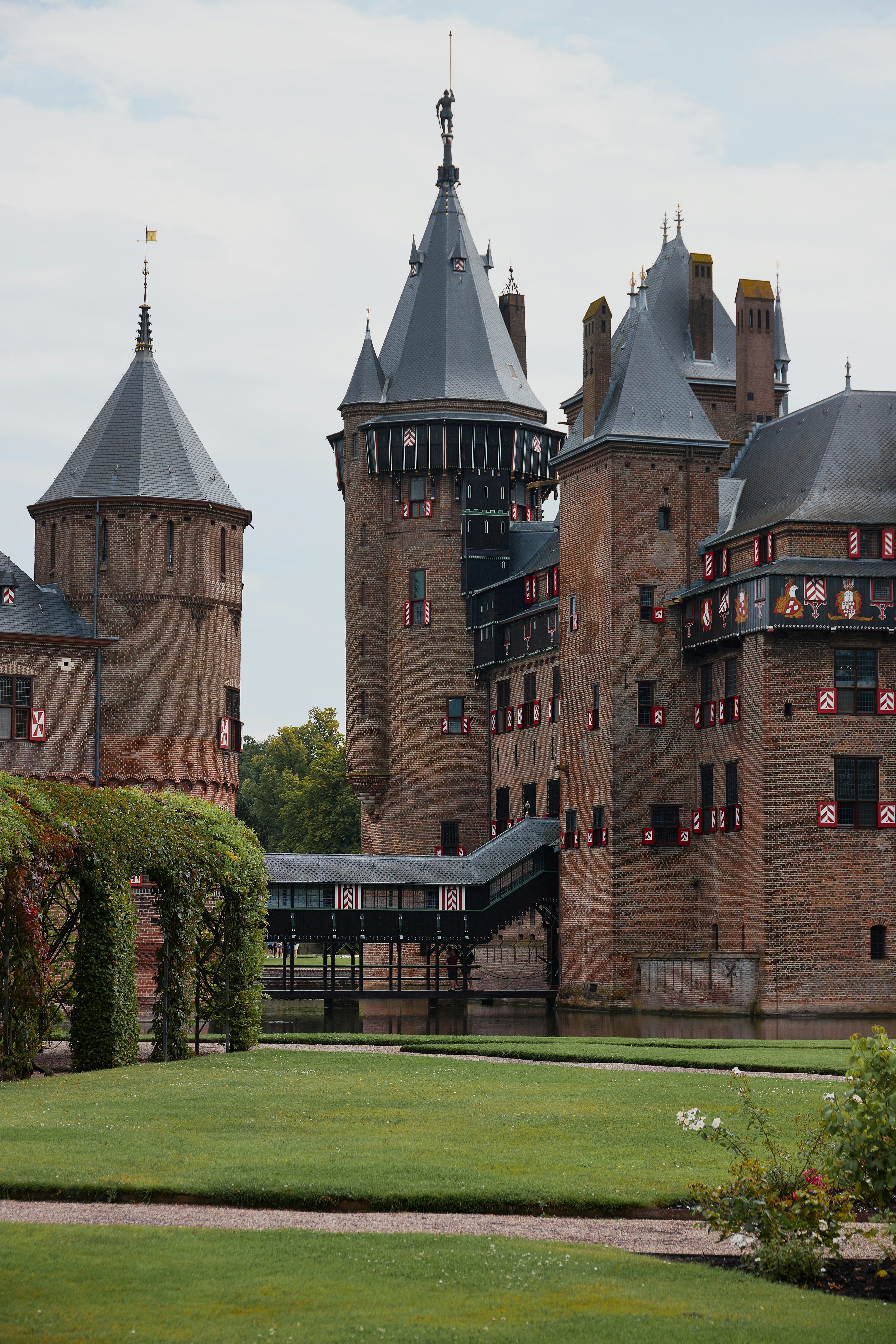 A large building with many windows and towers photo – Free Netherlands ...