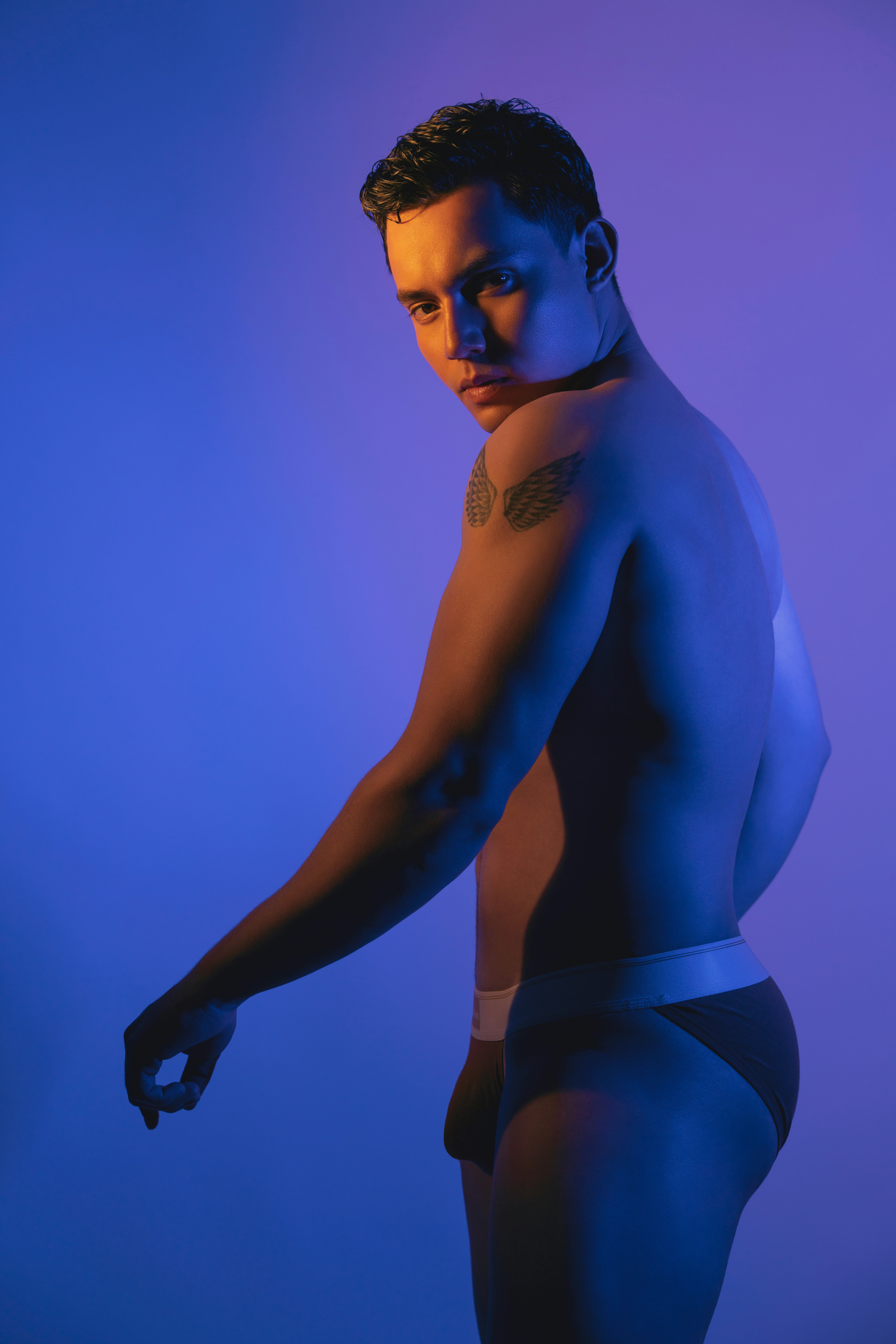 Blue Hour Silhouette: A Portrait in Neon Hues