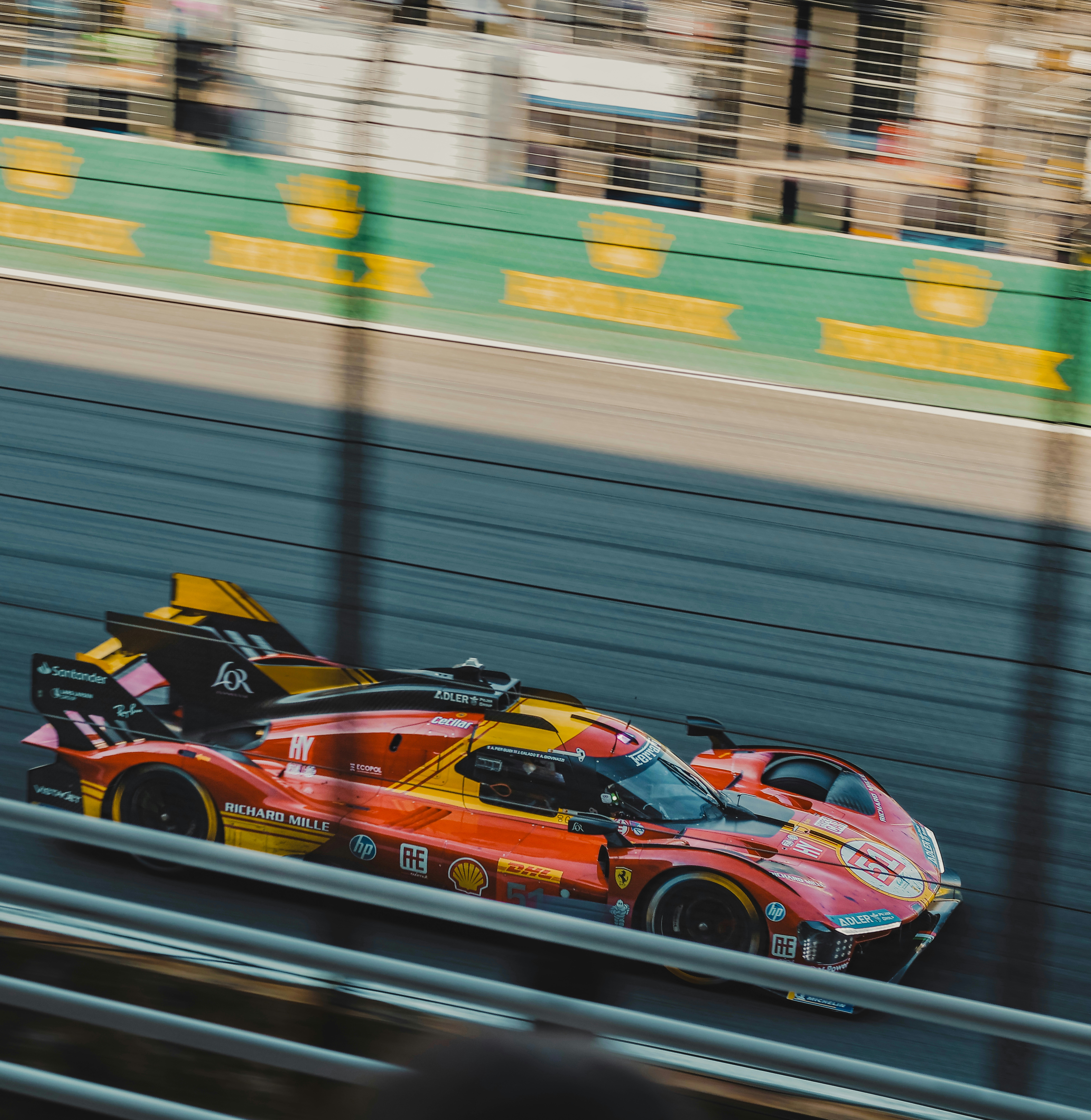 Two race cars racing on a track with spectators watching photo – Free ...