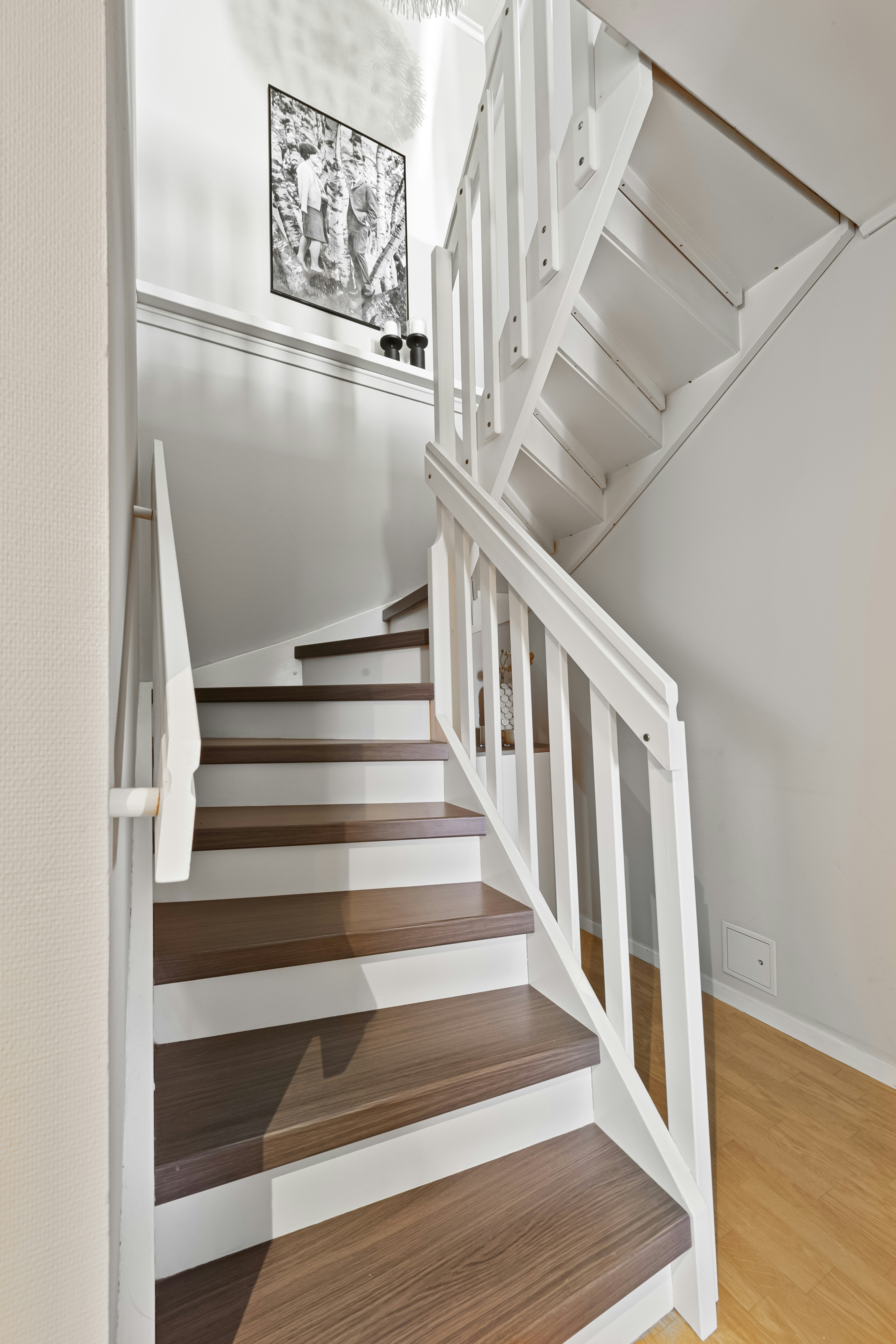 A white staircase with wood floors and white railing photo – Free Wood ...