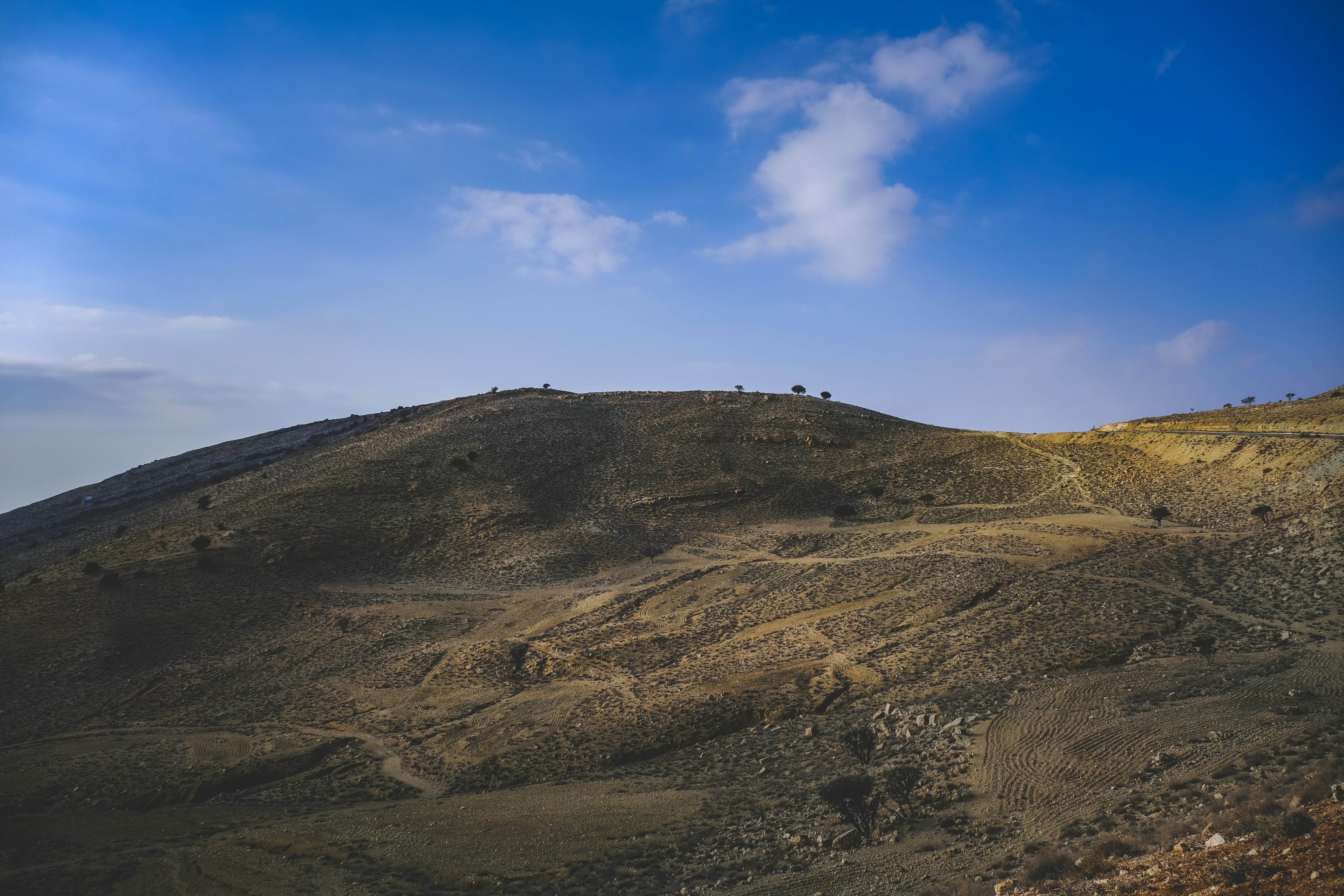 A view of a hill from the top of a hill photo – Free Nature Image on ...