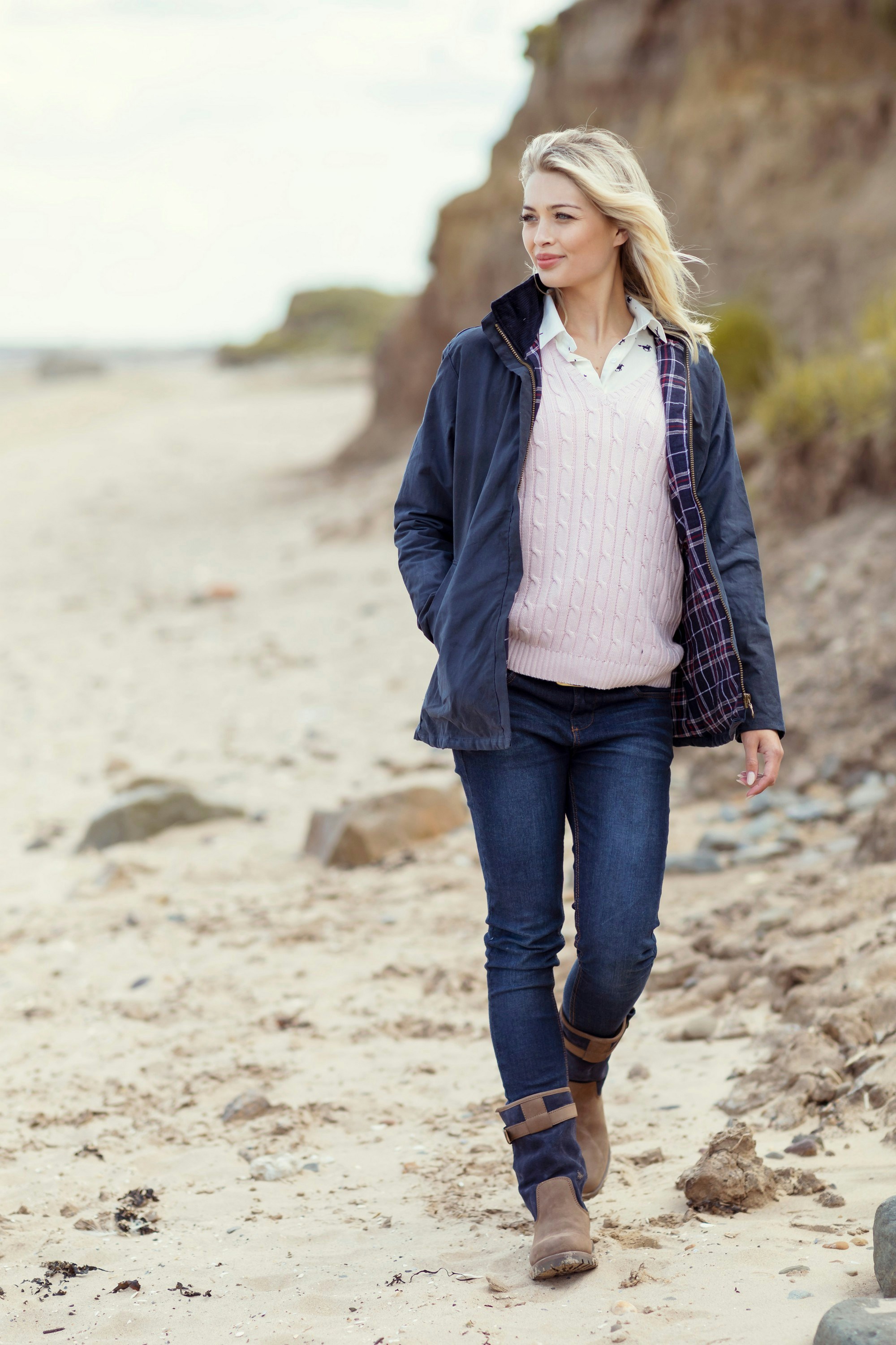 Coastal Confidence: A Seaside Portrait on a Wind-Swept Beach