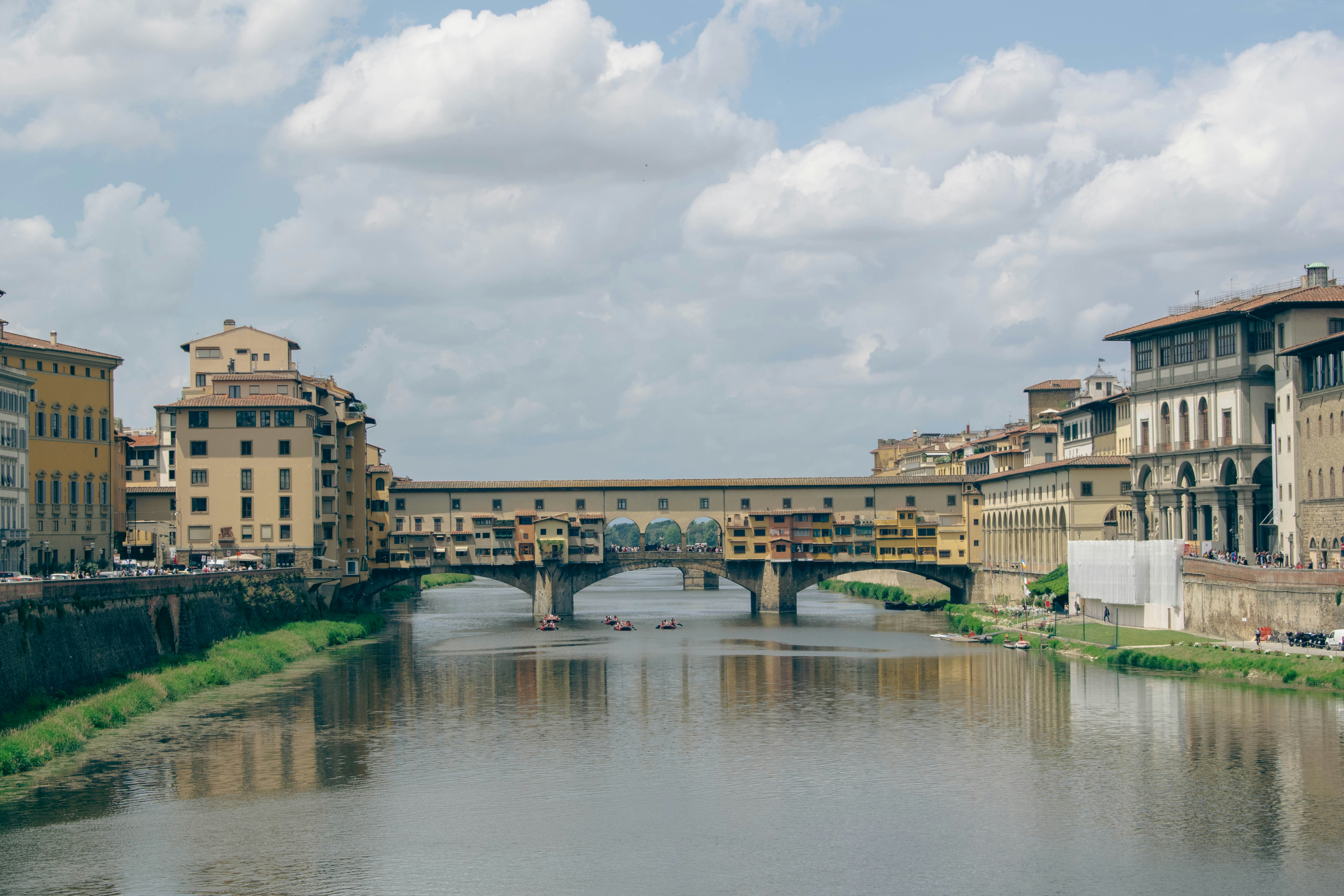 Morning Light Over Florence's Arno Bridge: Arches, Water, and Time