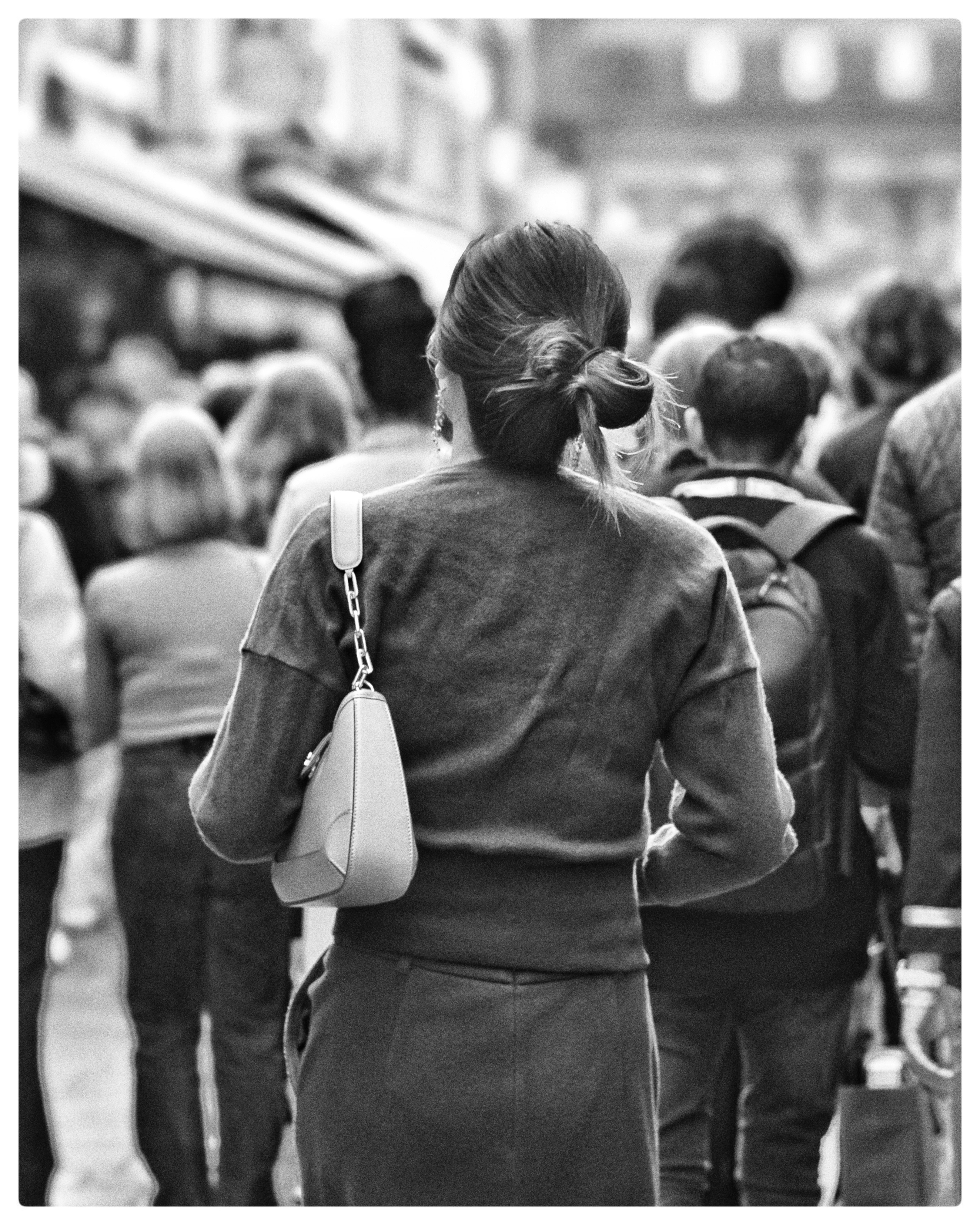 Back to the City: A Woman Among the Crowd