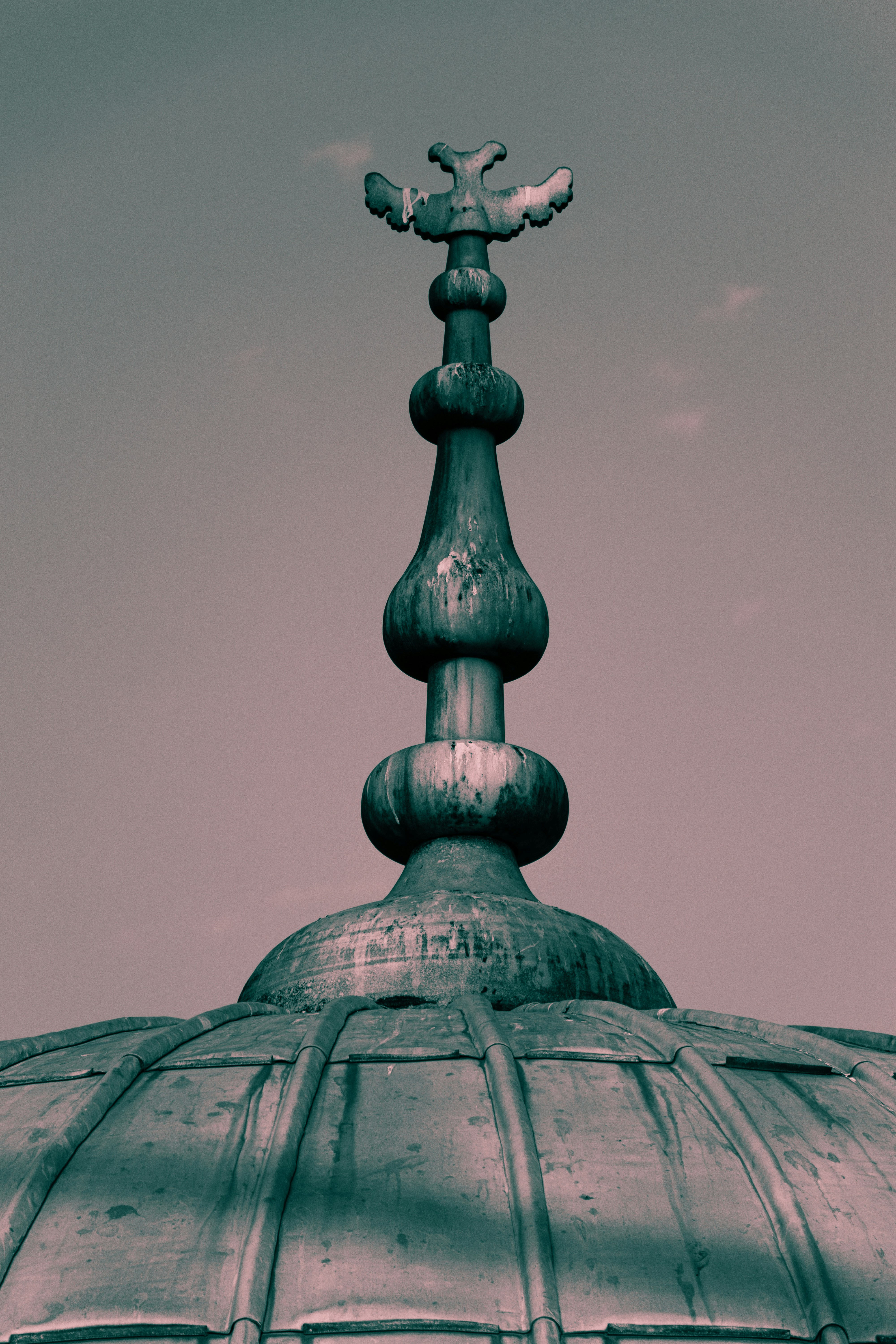 A large metal dome with a cross on top photo – Free Cross Image on Unsplash