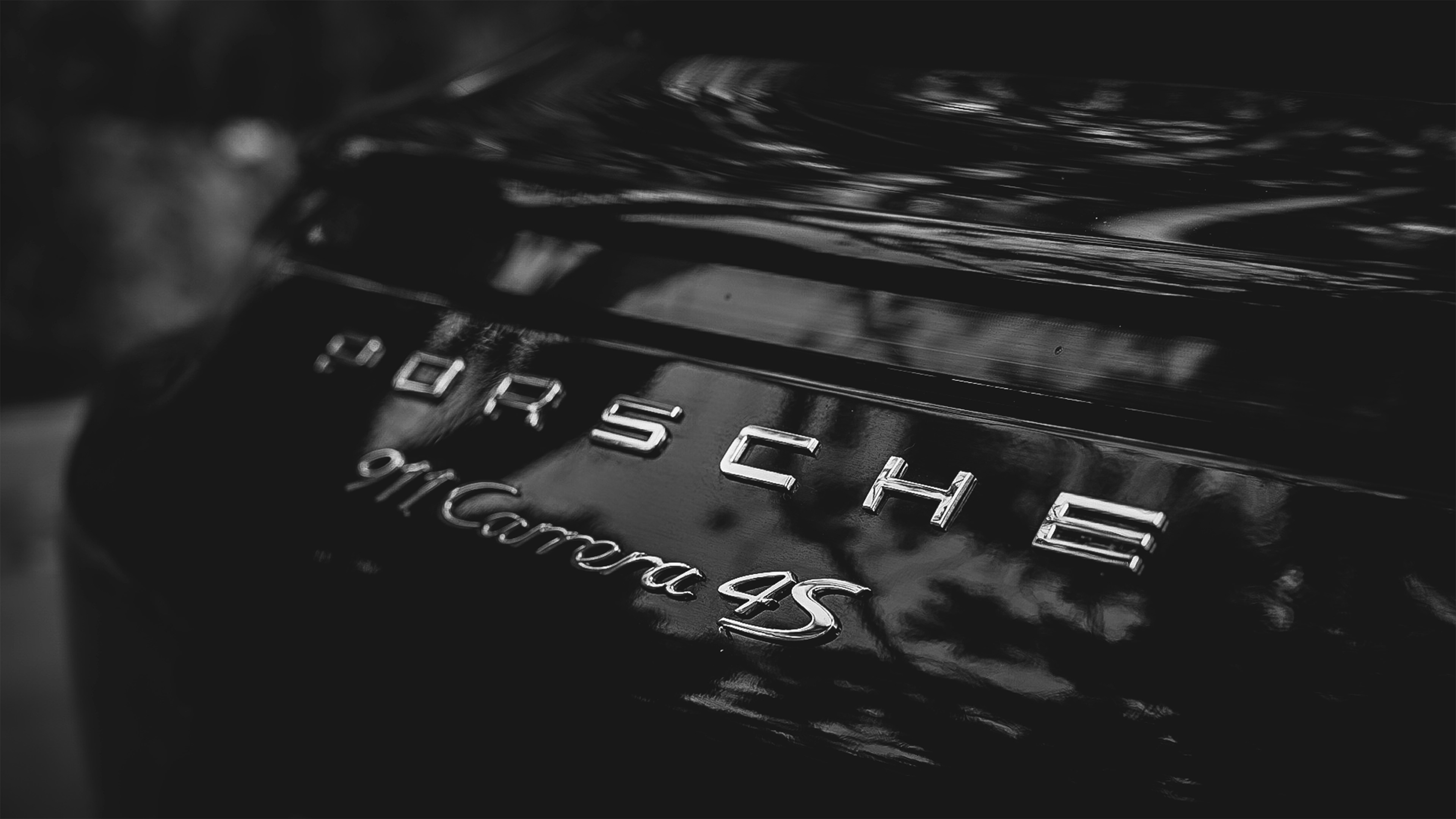 A black and white photo of a porsche logo photo – Free Etiler Image on ...
