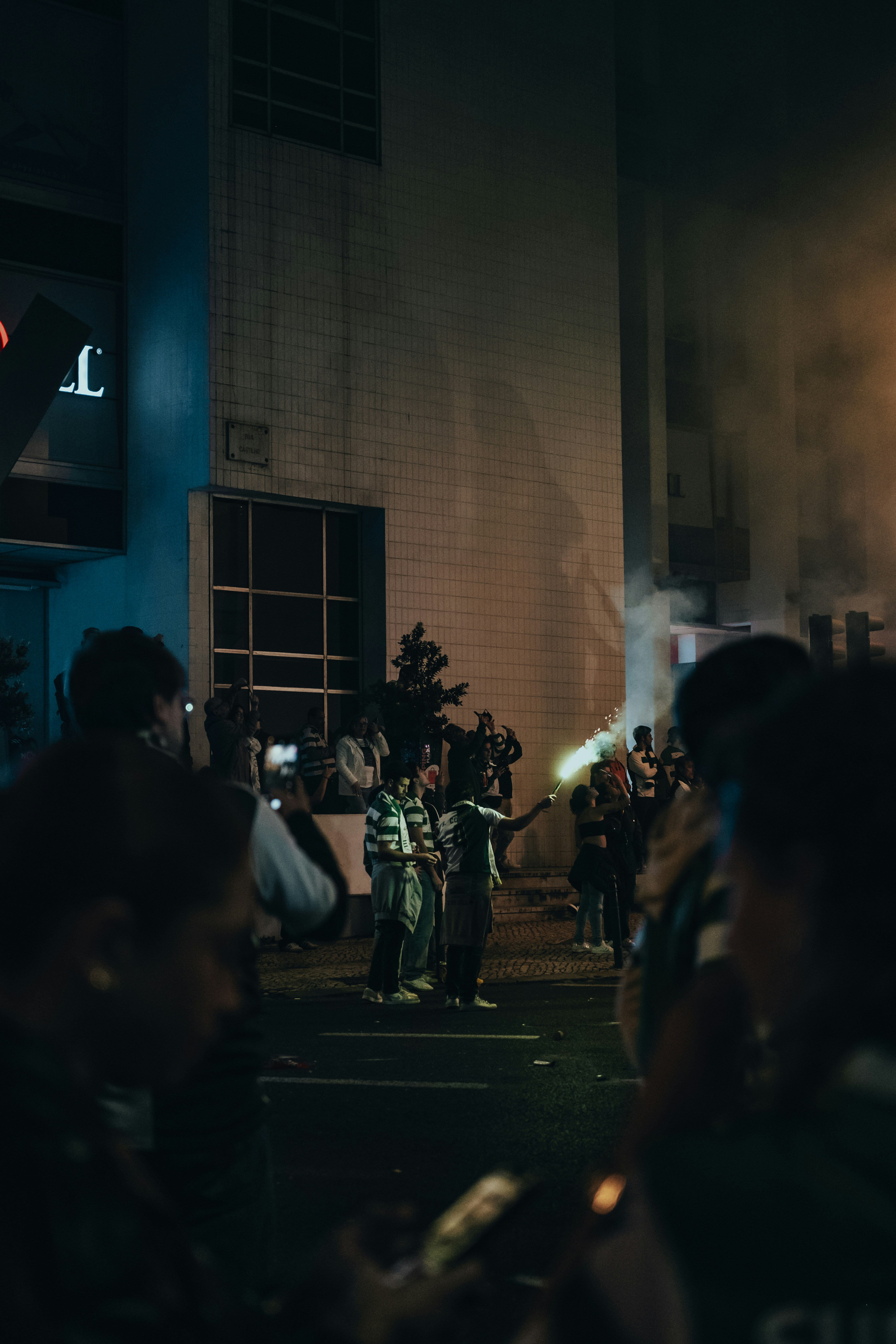 Night Fall: A Vigil of Fire and Shuttered Faces