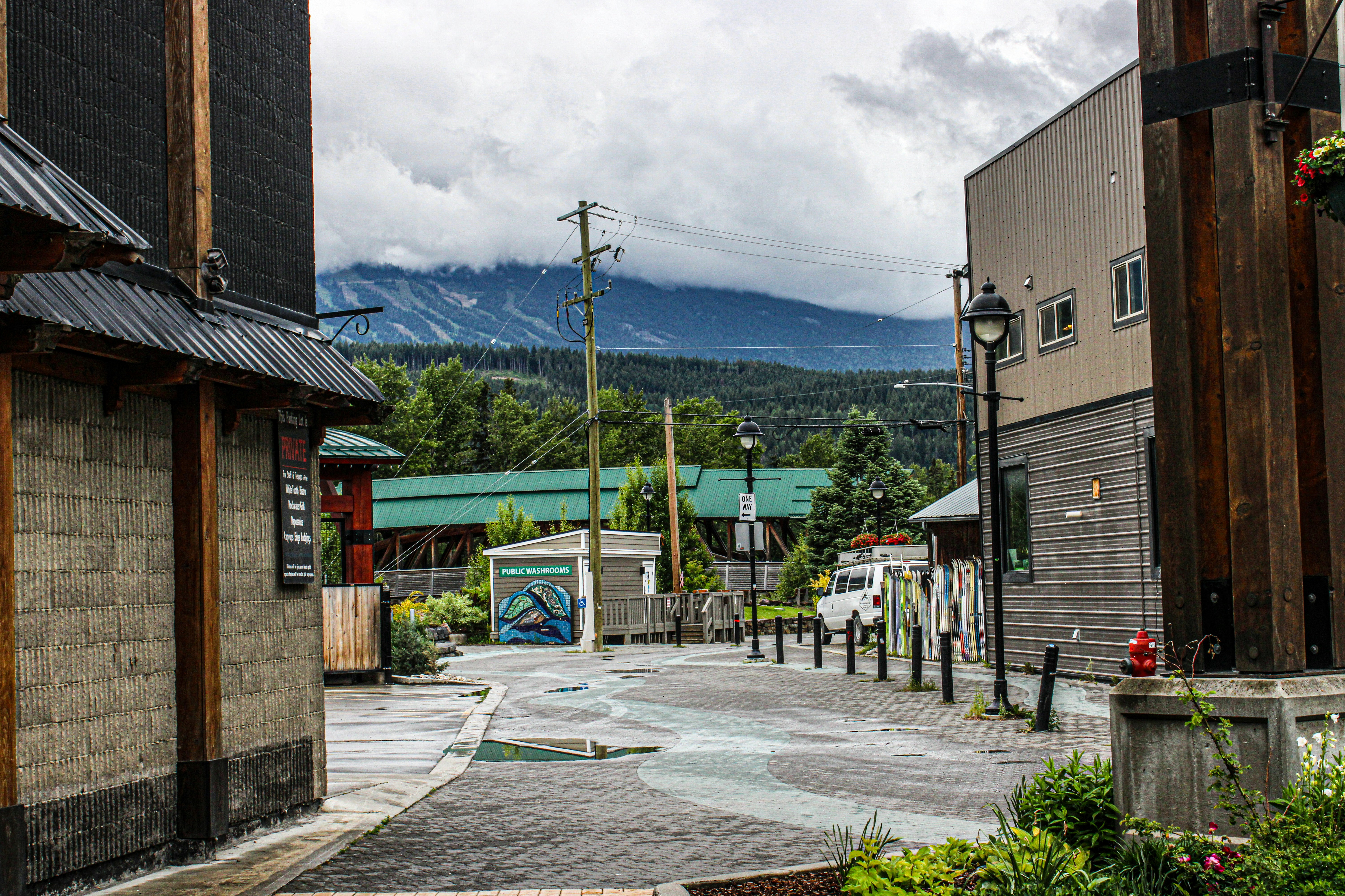 Cobbled Street Toward a Cloud-Capped Horizon