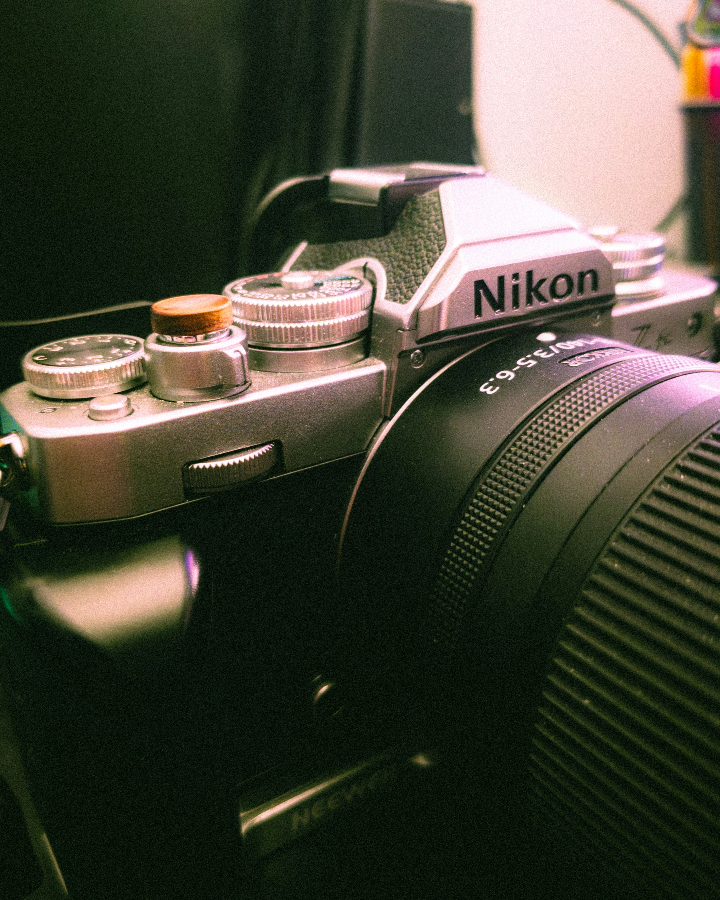 Chrome and Knurl: a close-up study of a Nikon SLR's mechanical details